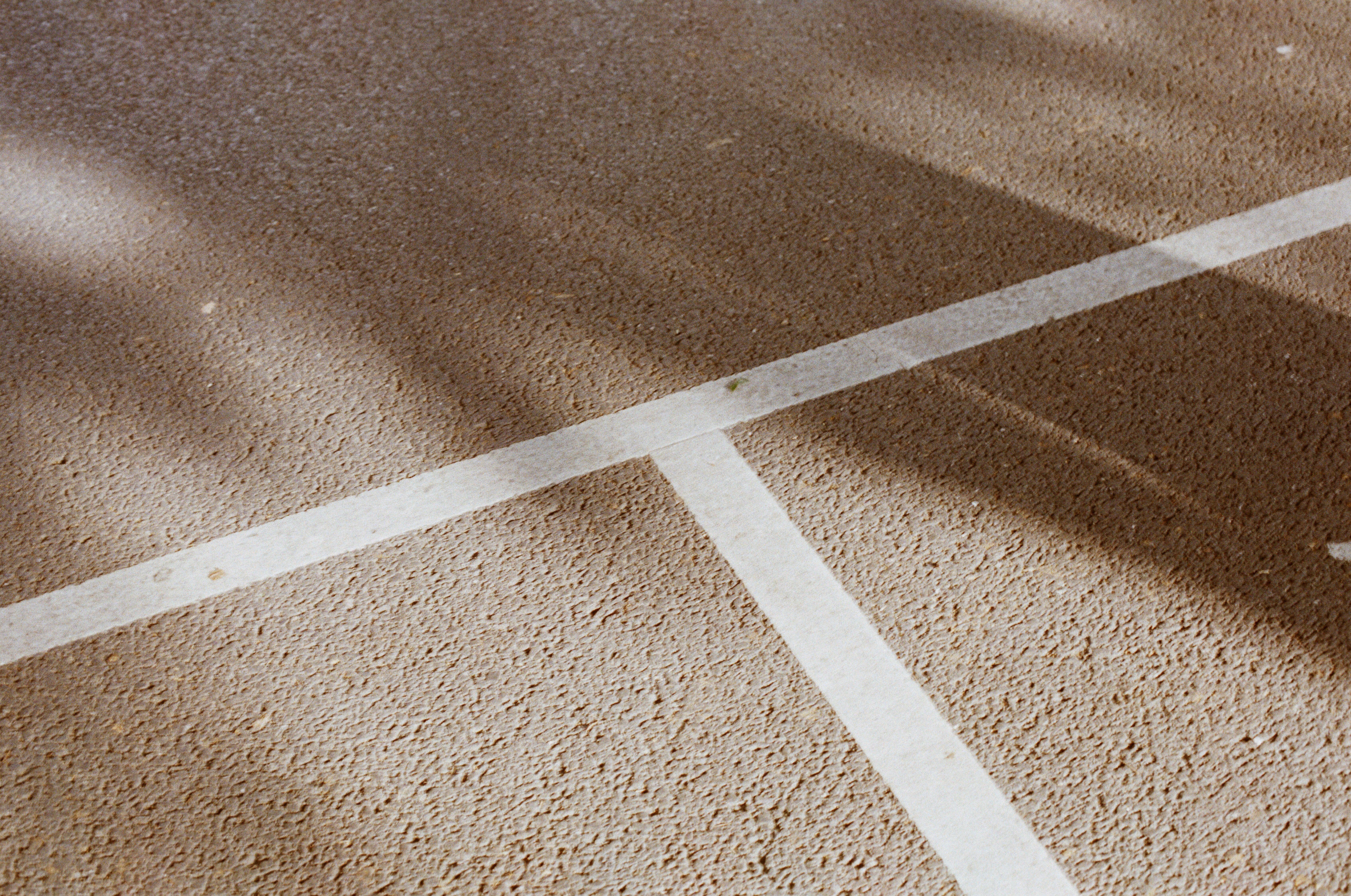 Shadows on Pavement · Free Stock Photo