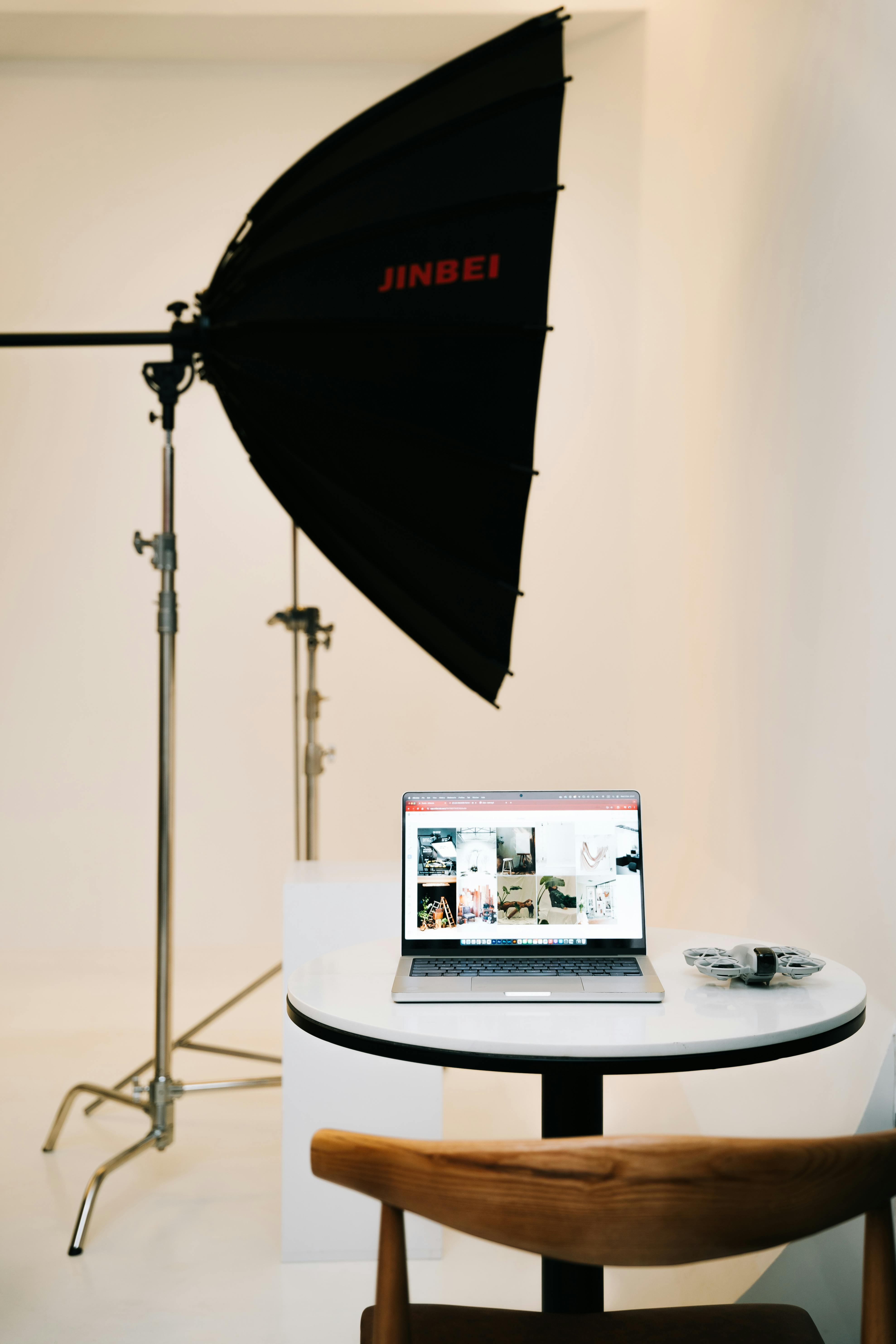 Professional Photography Studio Setup with Laptop · Free Stock Photo