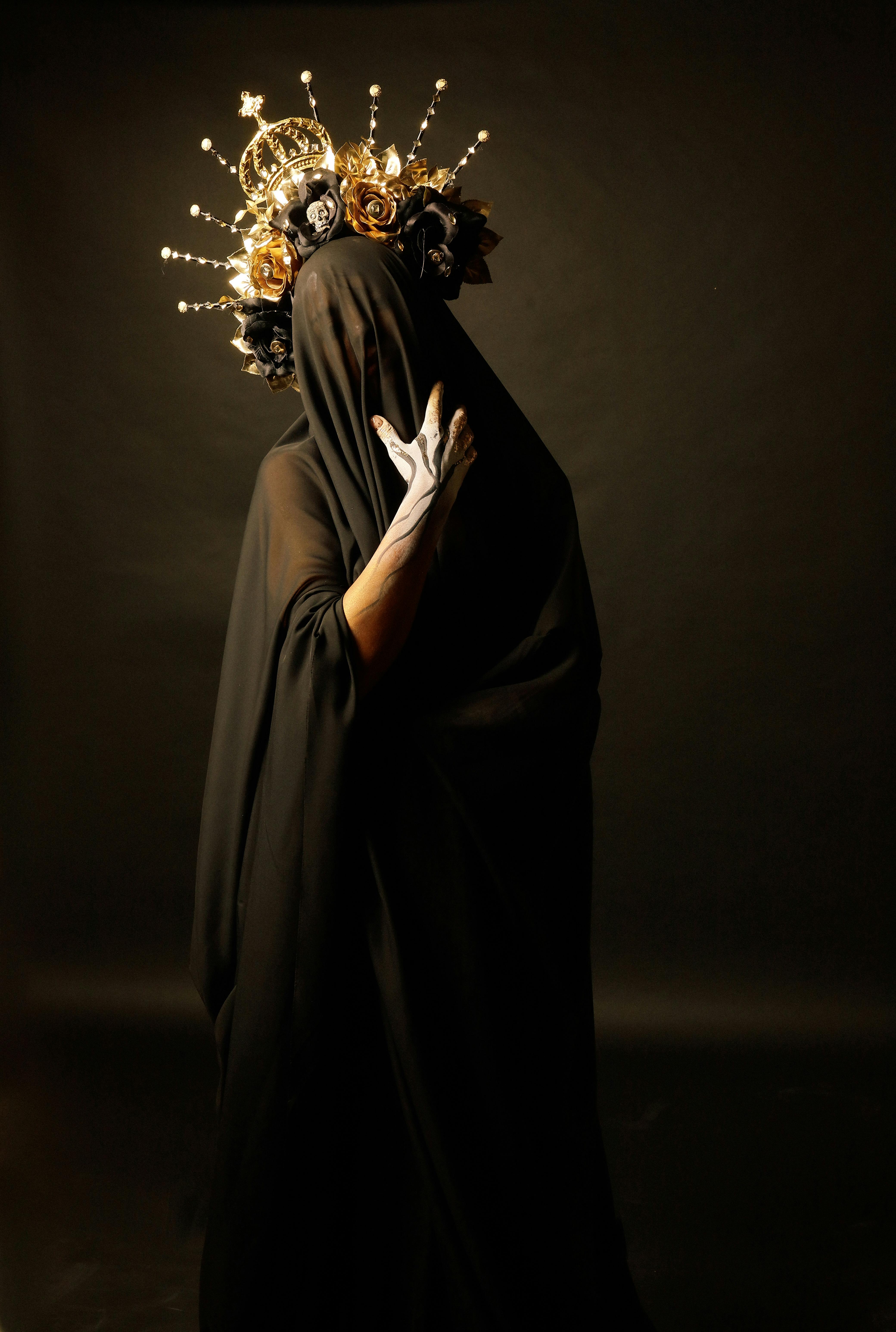 Mystical Figure in Ornate Headpiece and Black Veil · Free Stock Photo