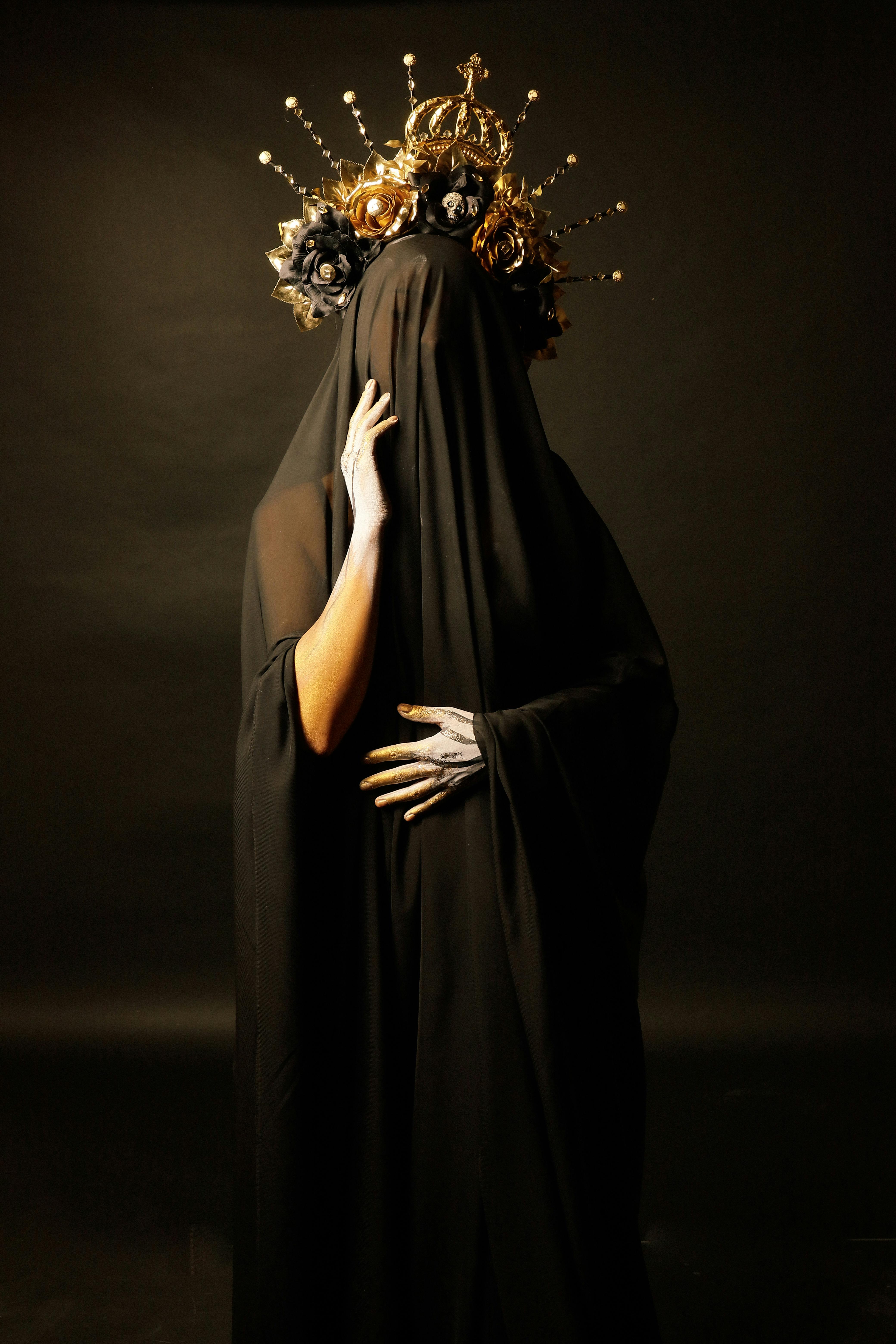 Mysterious Veiled Figure with Ornate Headpiece · Free Stock Photo