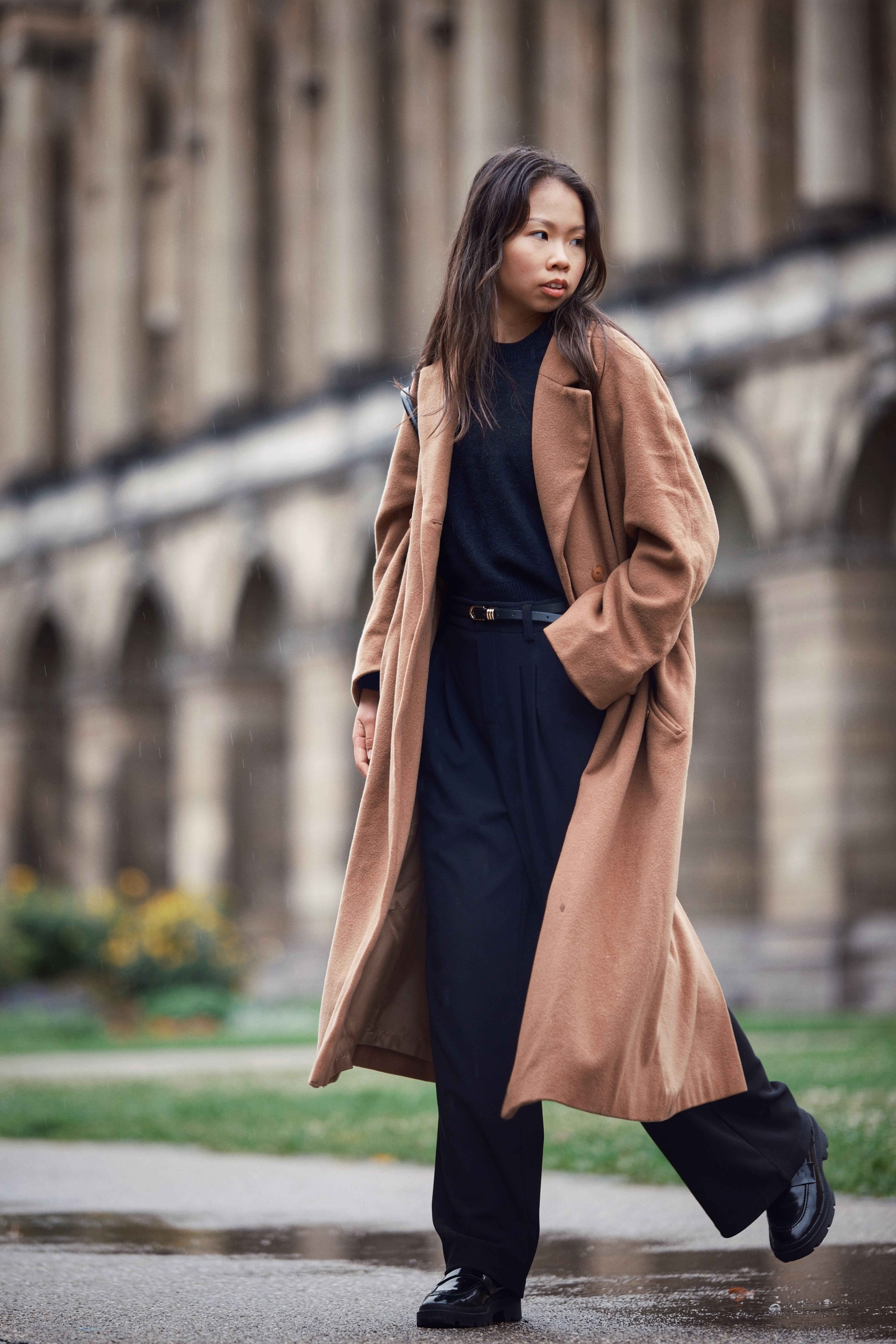 Stylish Woman Walking in Urban Setting · Free Stock Photo
