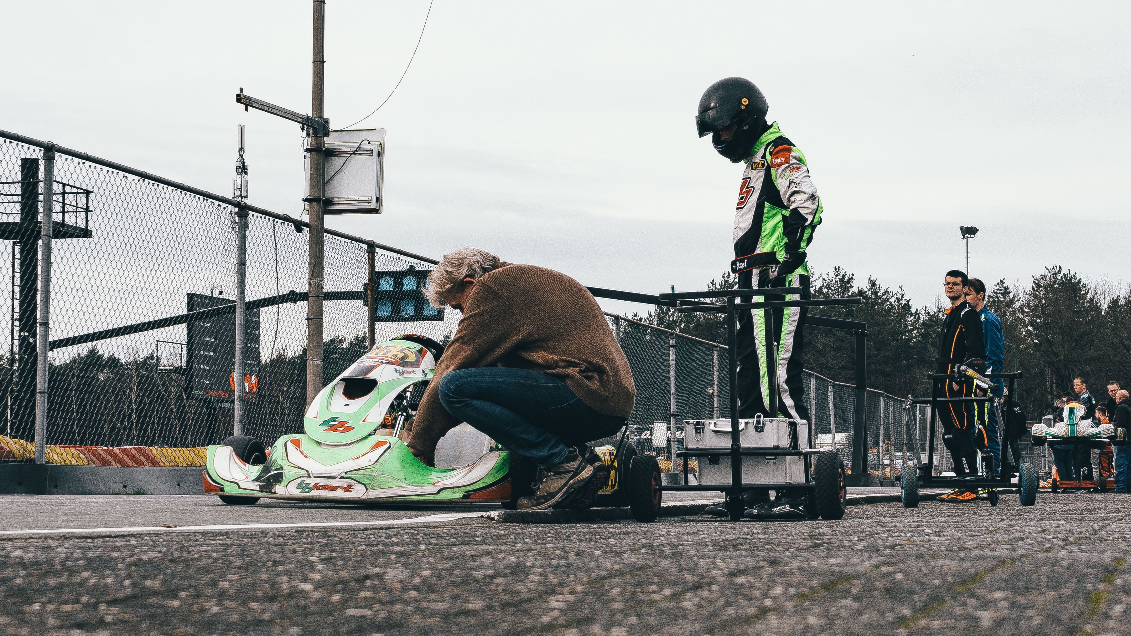 Pit Stop Preparation at Outdoor Go-Kart Circuit · Free Stock Photo