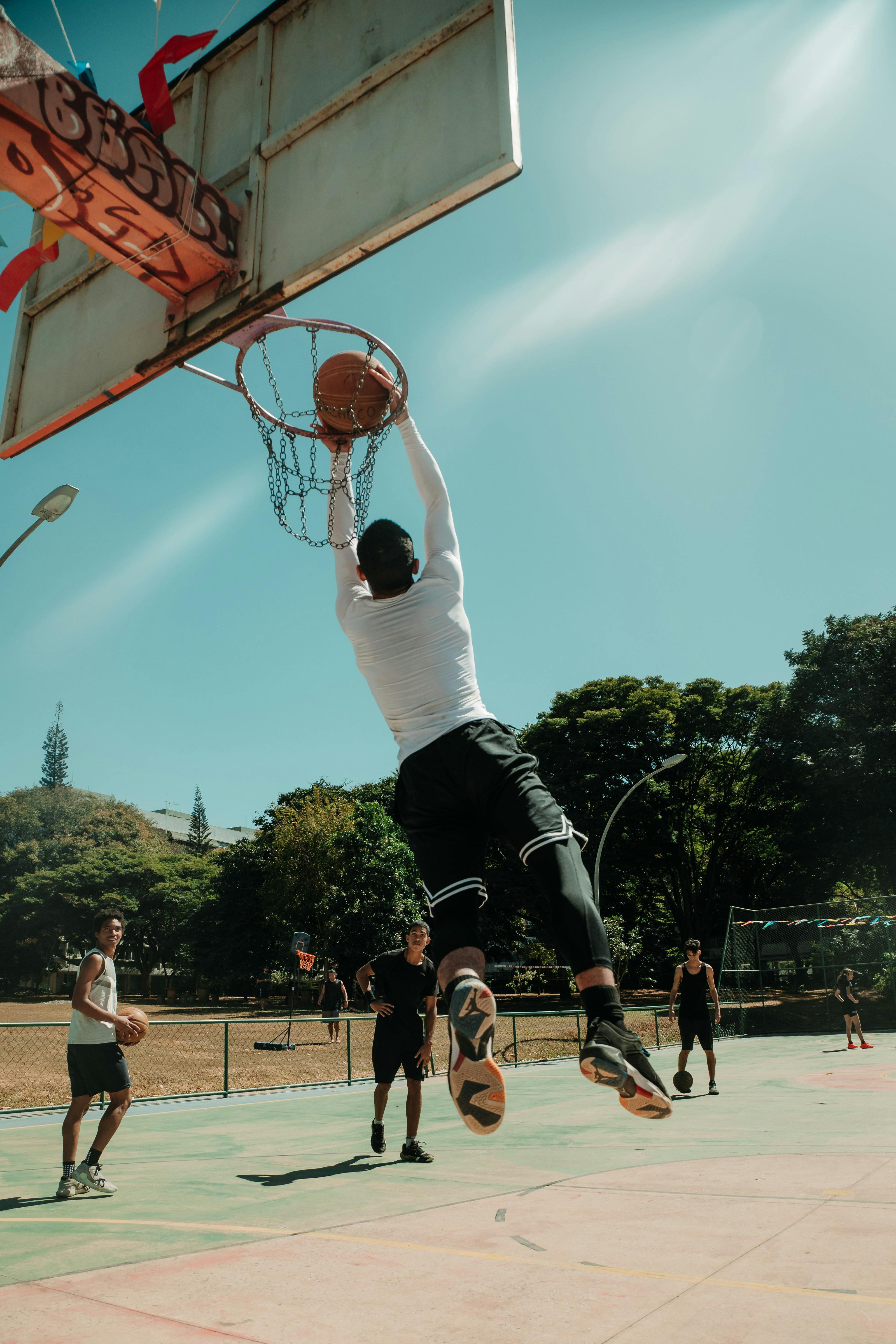 Man Dunking the Ball · Free Stock Photo