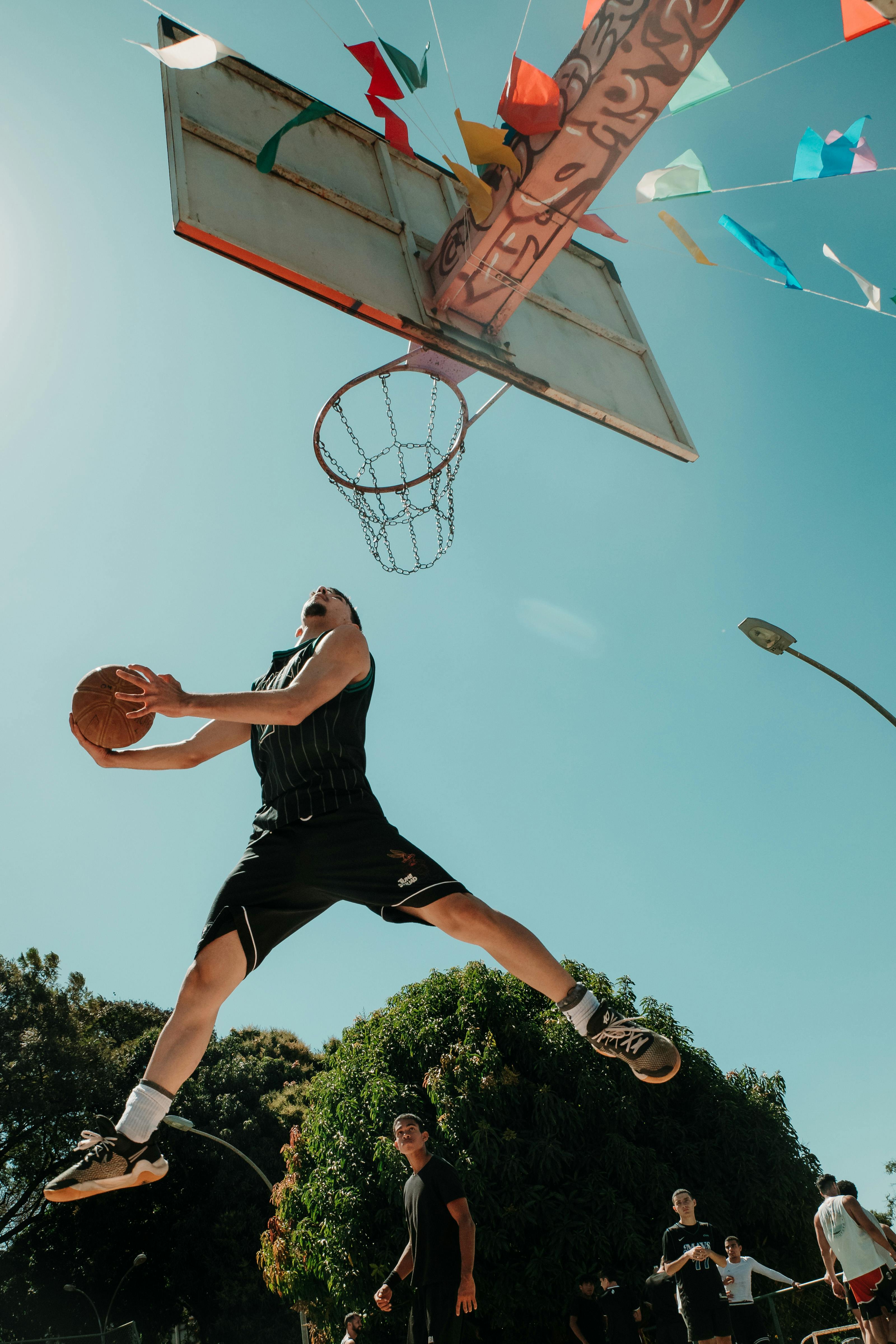 Photo Of Man Doing Dunk · Free Stock Photo