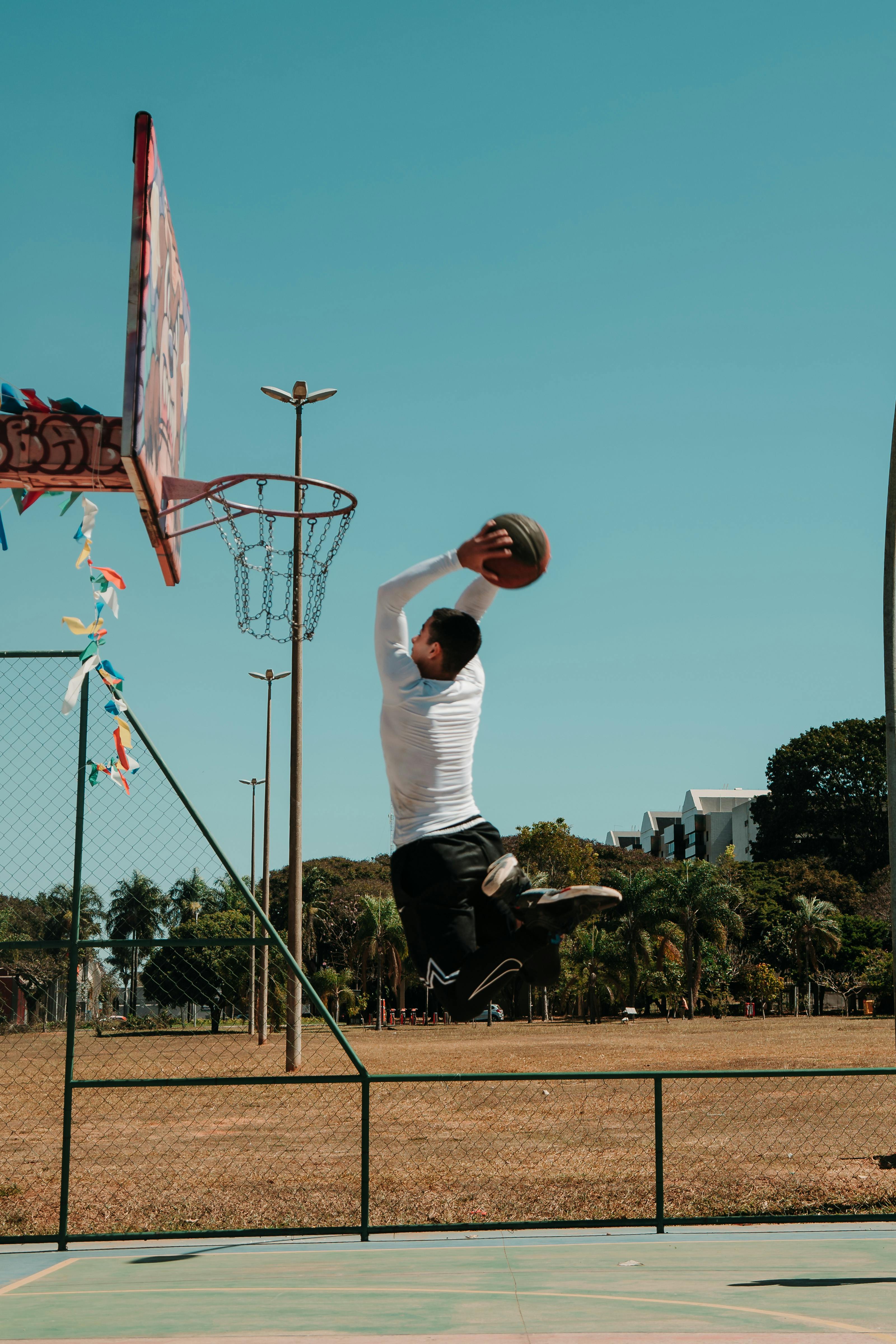 Man Dunking the Ball · Free Stock Photo