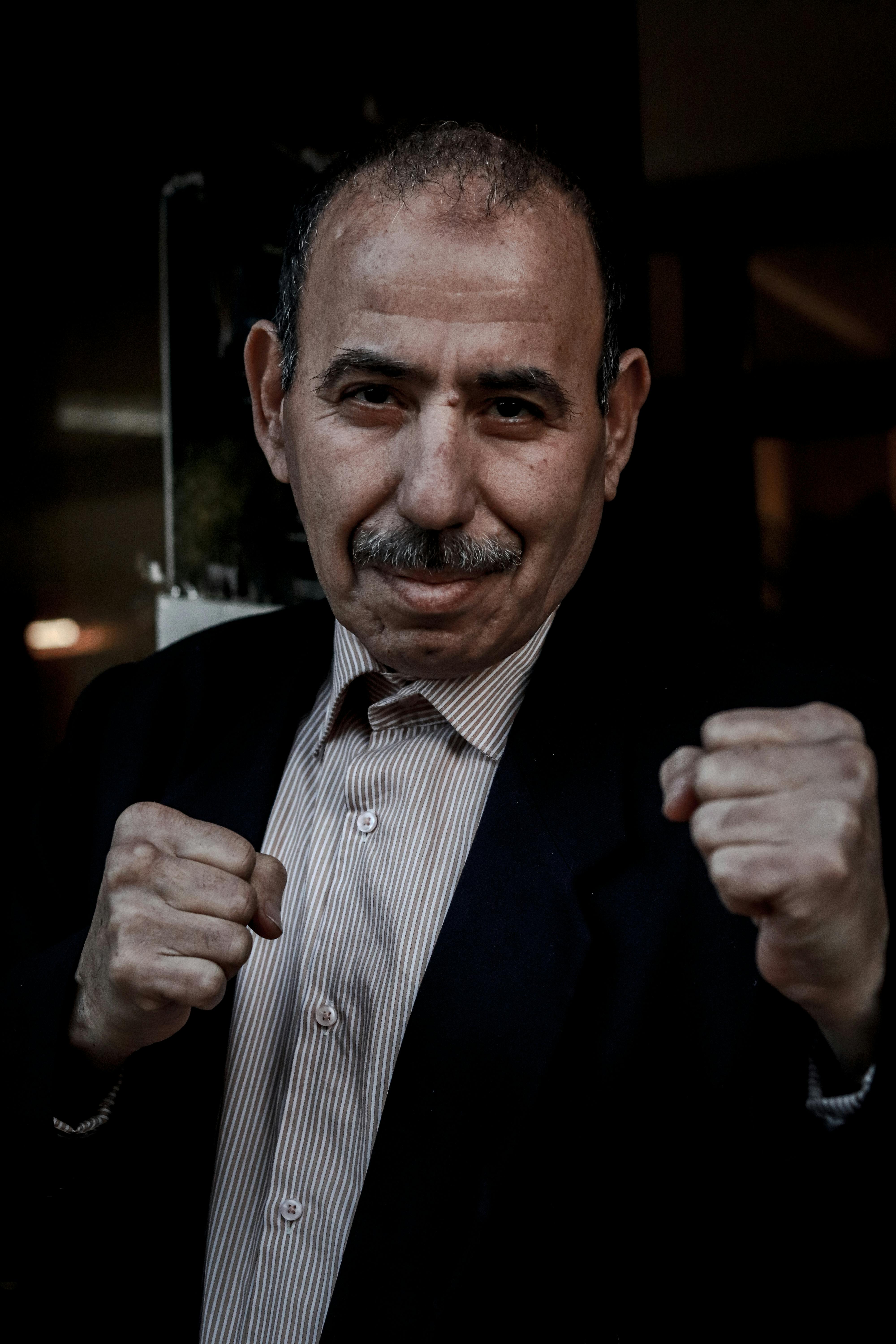 Portrait of a Confident Older Man in Suit · Free Stock Photo