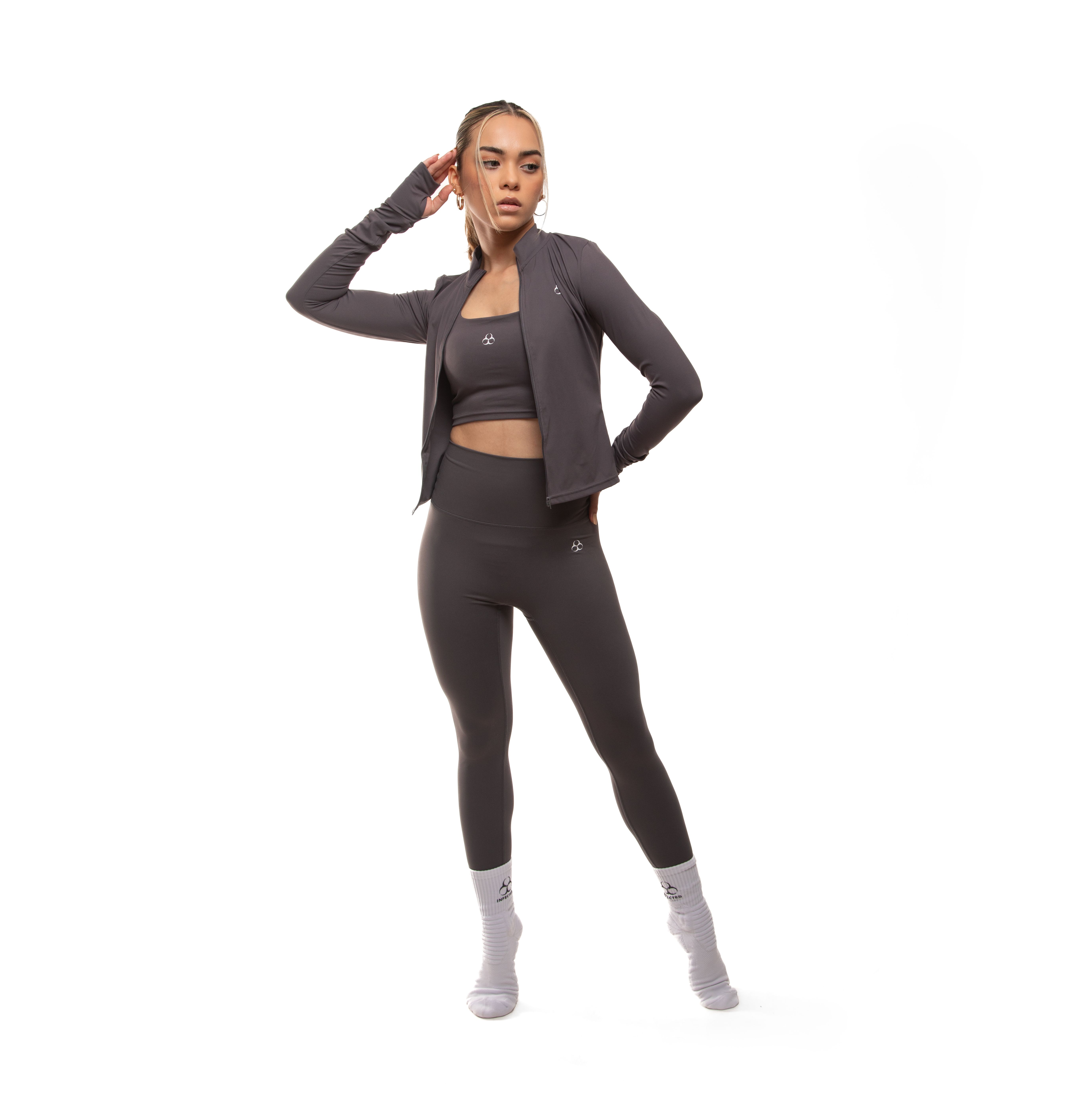 Woman Posing in Stylish Activewear Set · Free Stock Photo