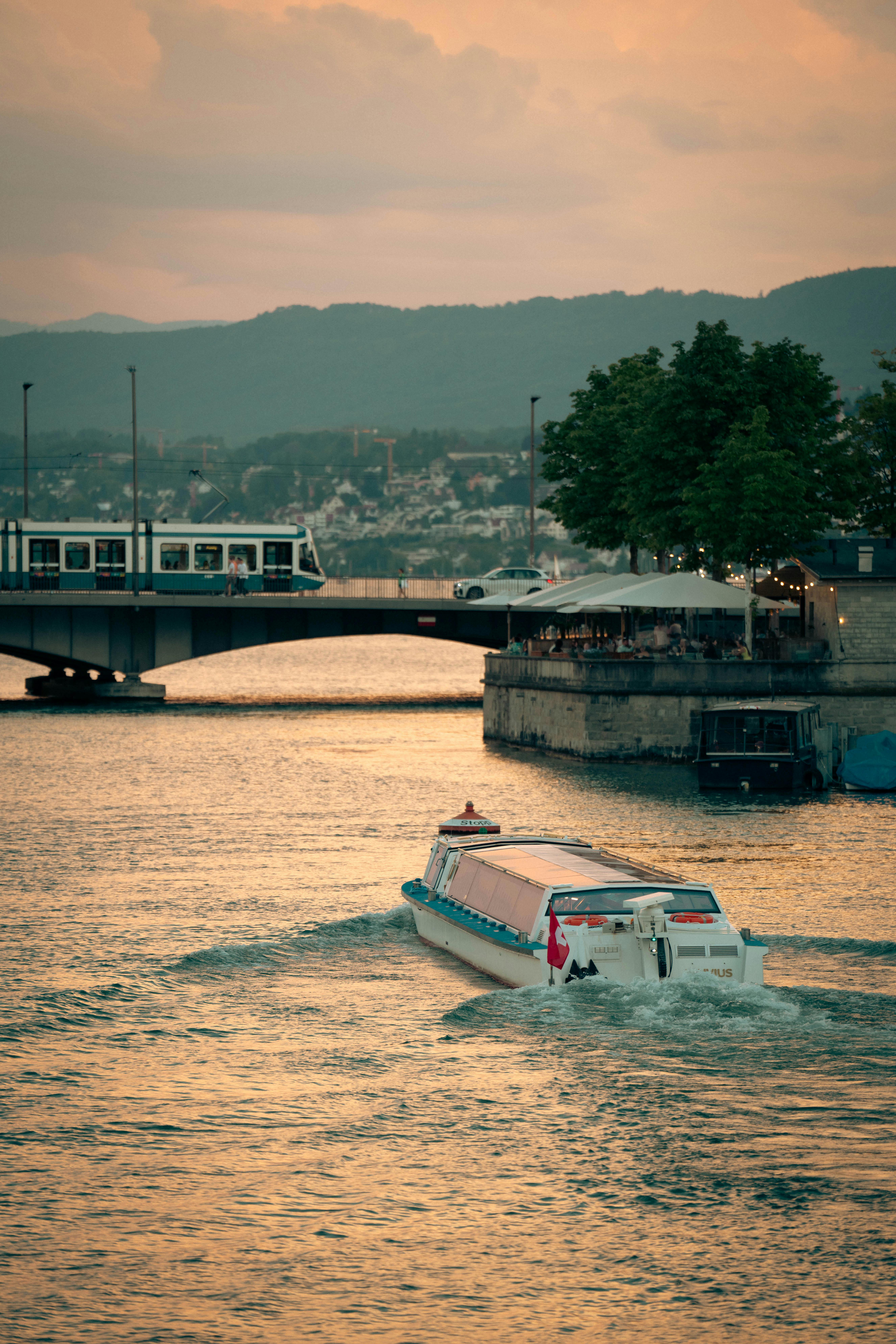 Boat and Train at Sunset by Bridge · Free Stock Photo