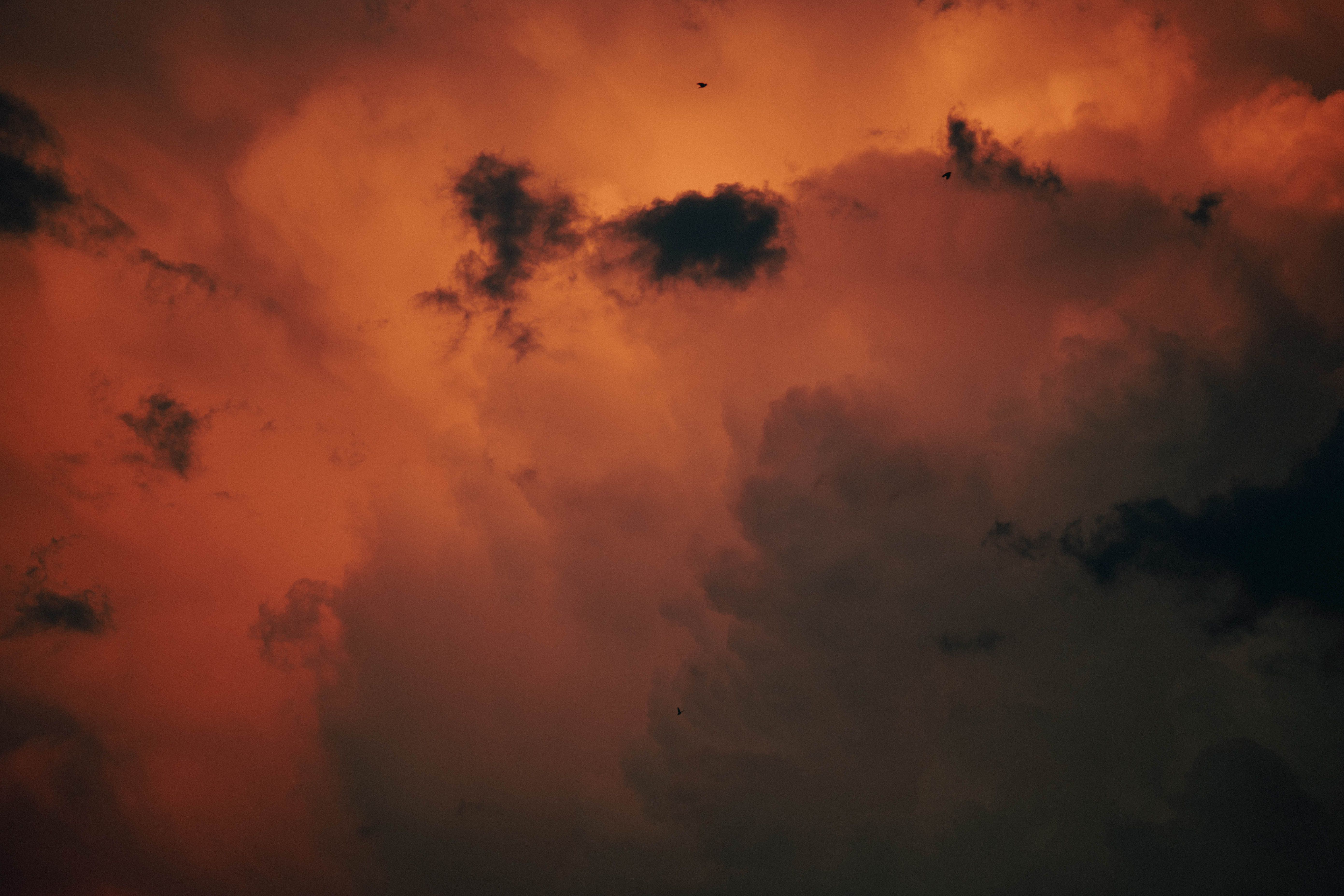 Dramatic Sunset Clouds with Orange Hue · Free Stock Photo