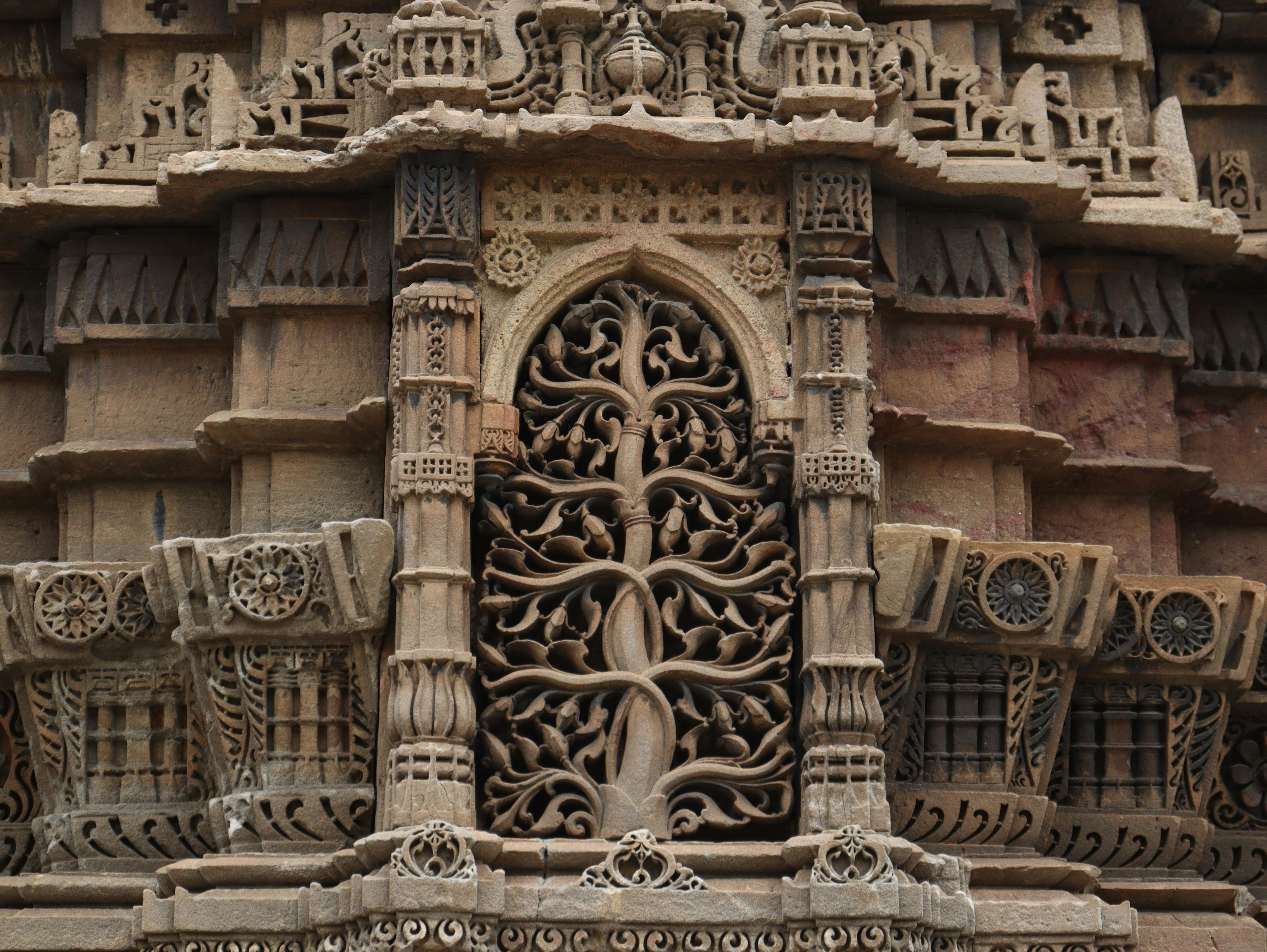 Intricate Stone Carving on Historic Monument · Free Stock Photo
