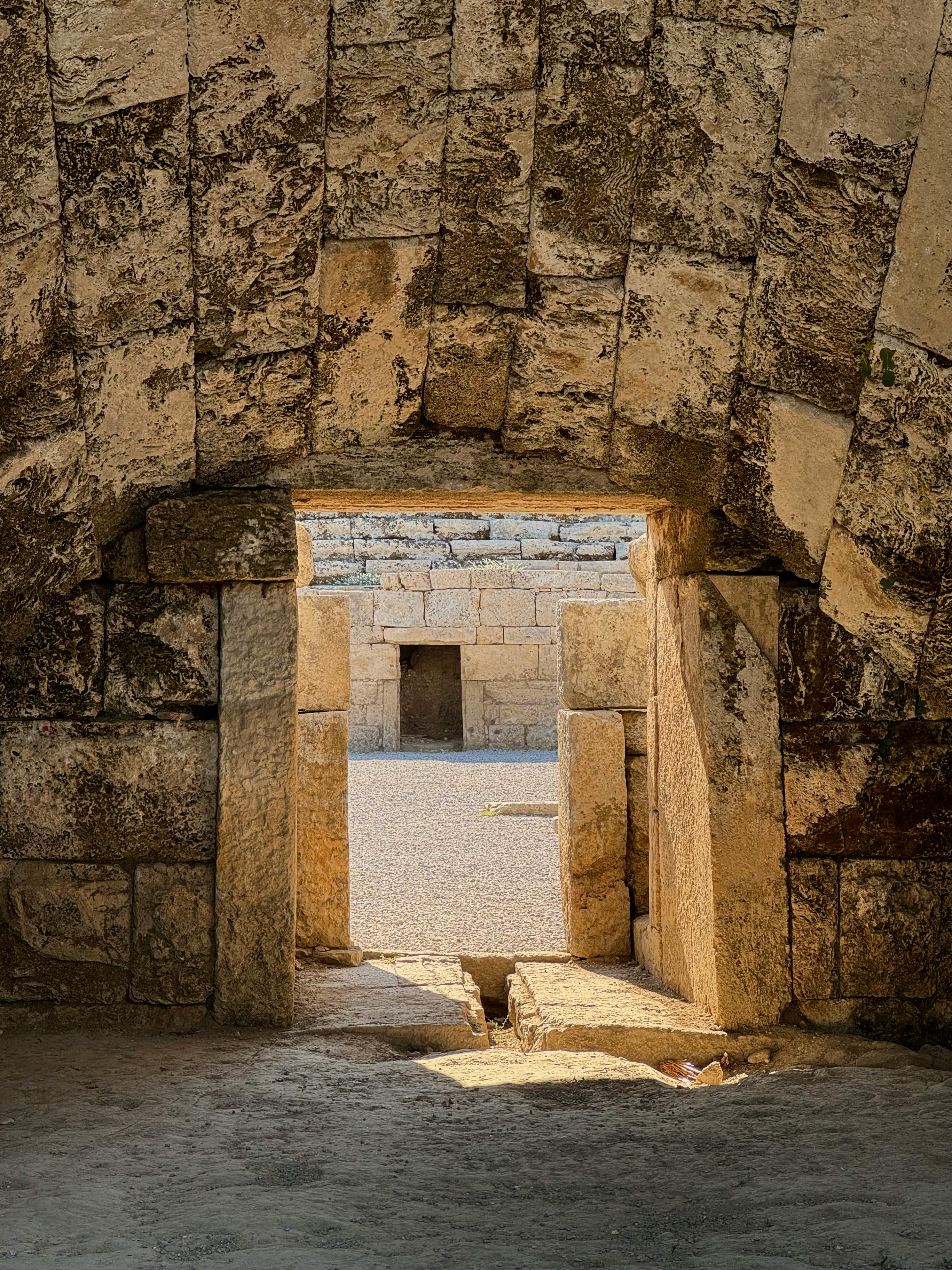 Ancient Stone Archway Leading to Arena Ruins · Free Stock Photo
