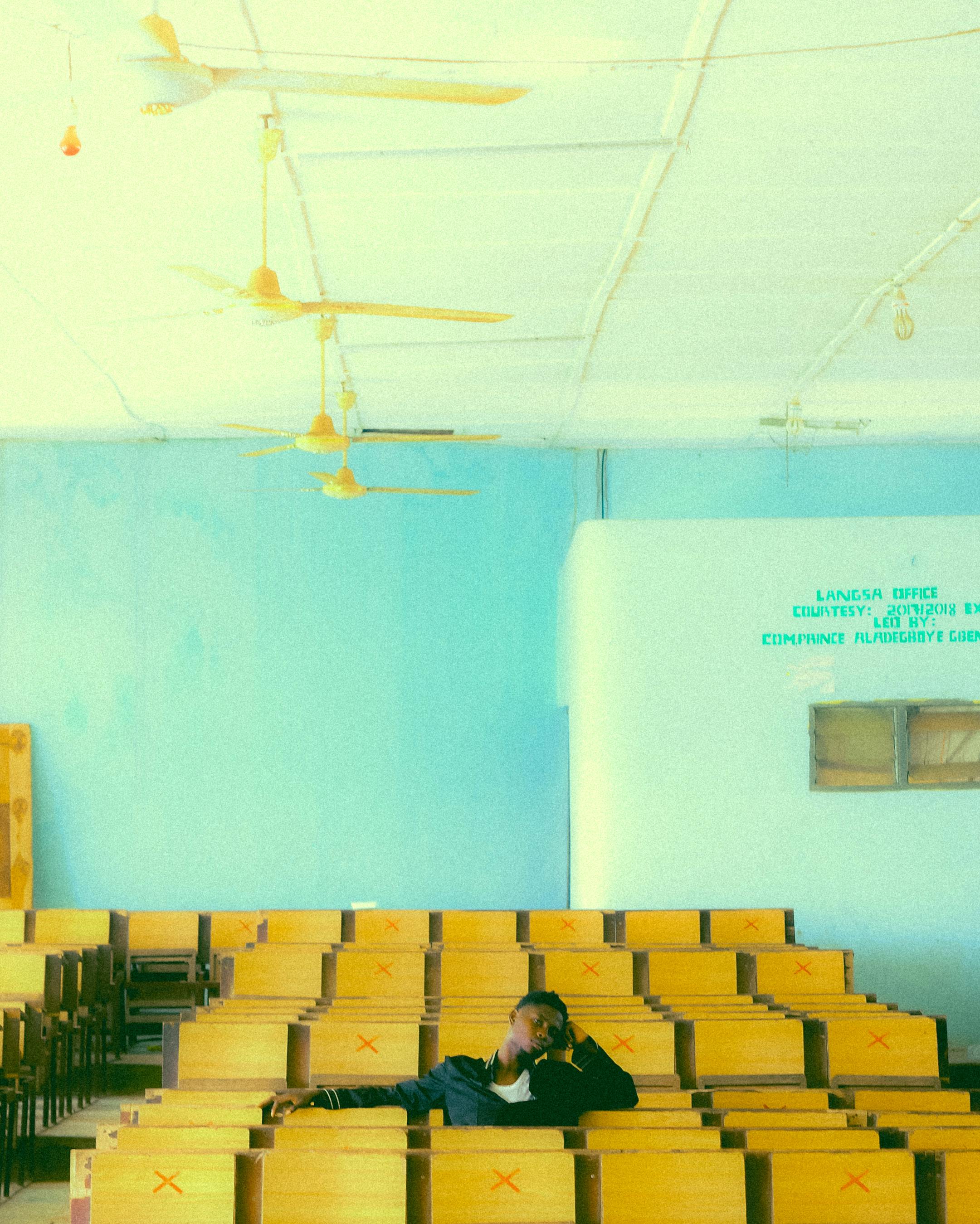 Lonely Student in an Empty Classroom · Free Stock Photo