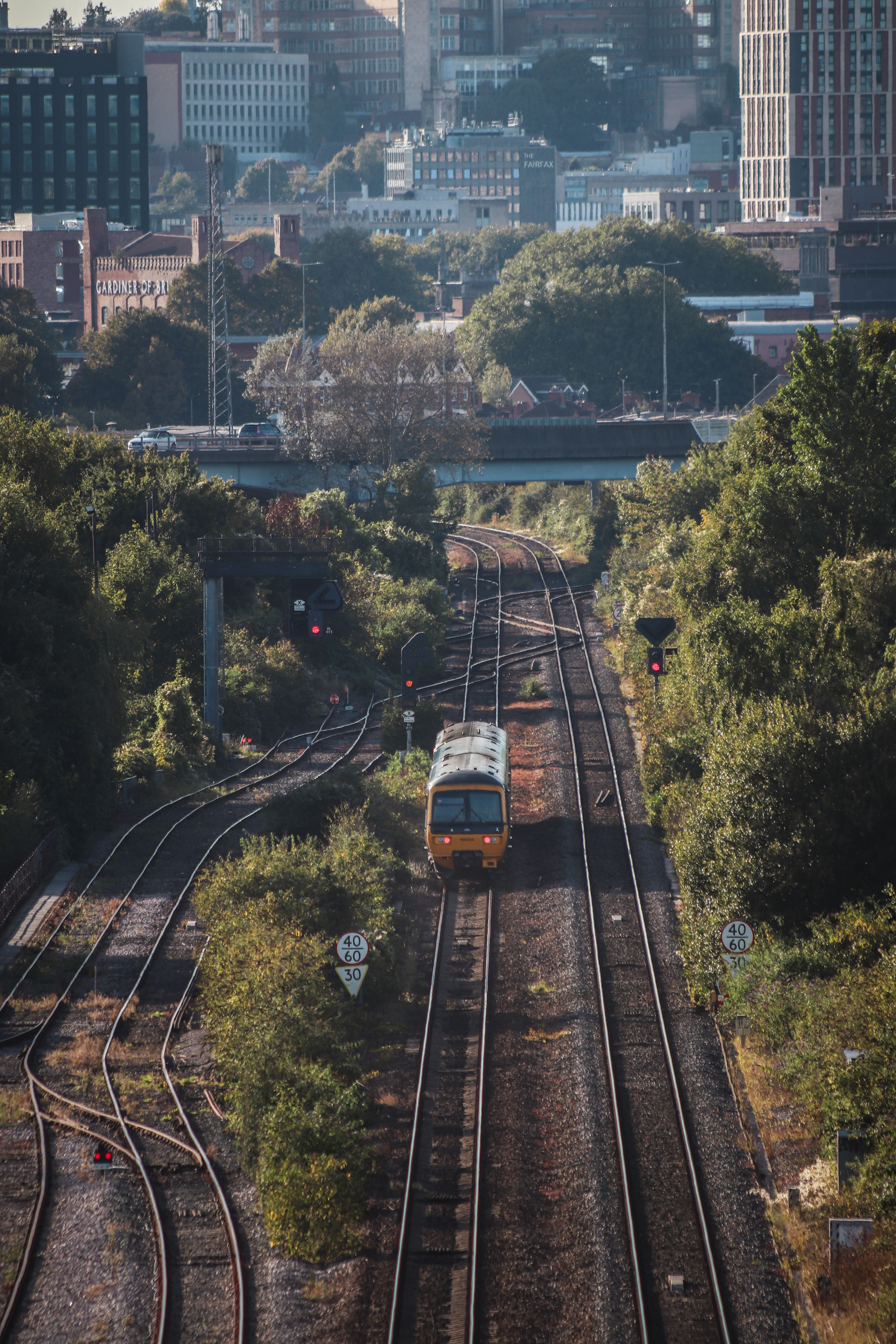 Scenic Train Journey through Bristol's Greenery · Free Stock Photo