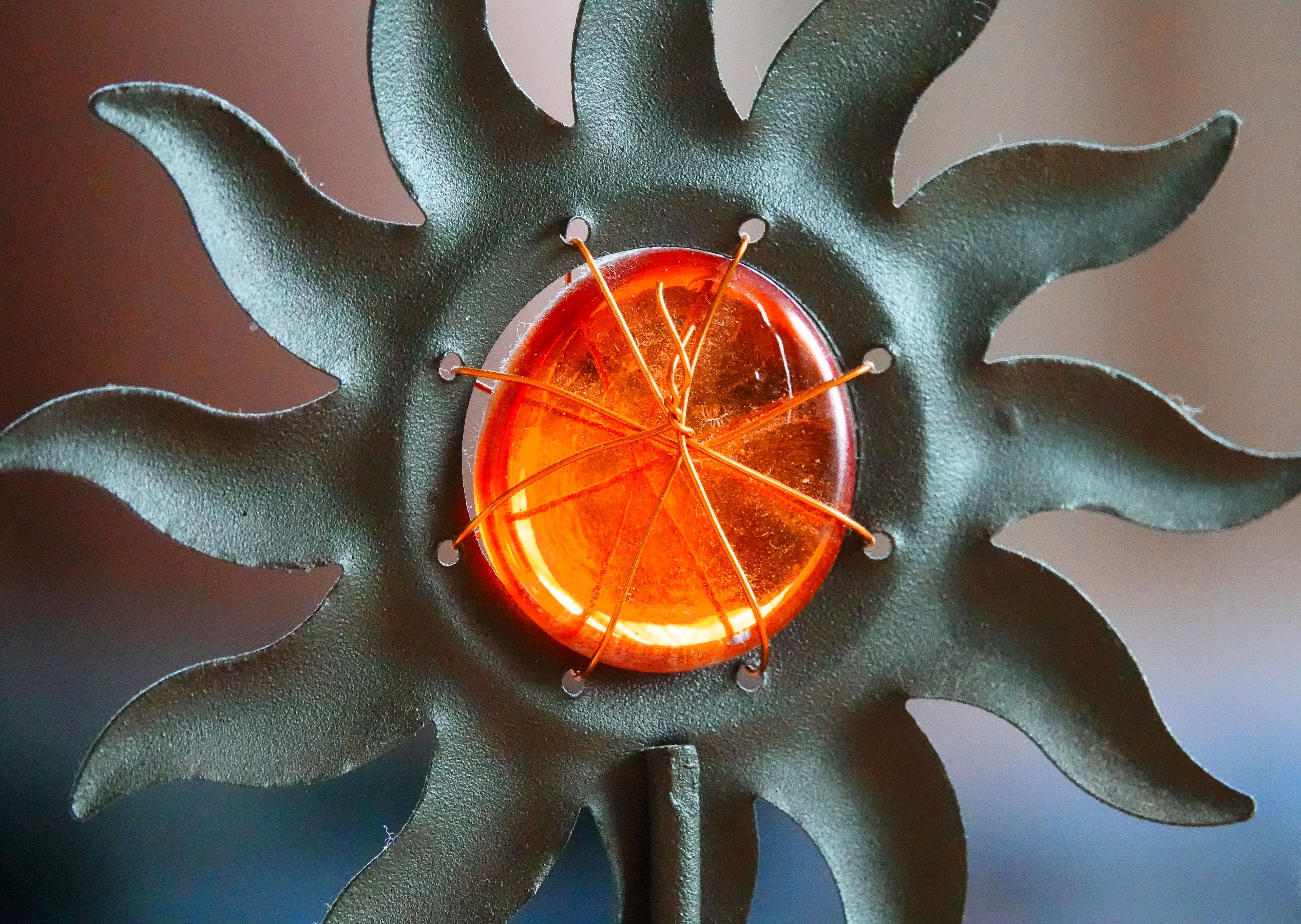 Close-up of Artistic Metal Sun Sculpture · Free Stock Photo