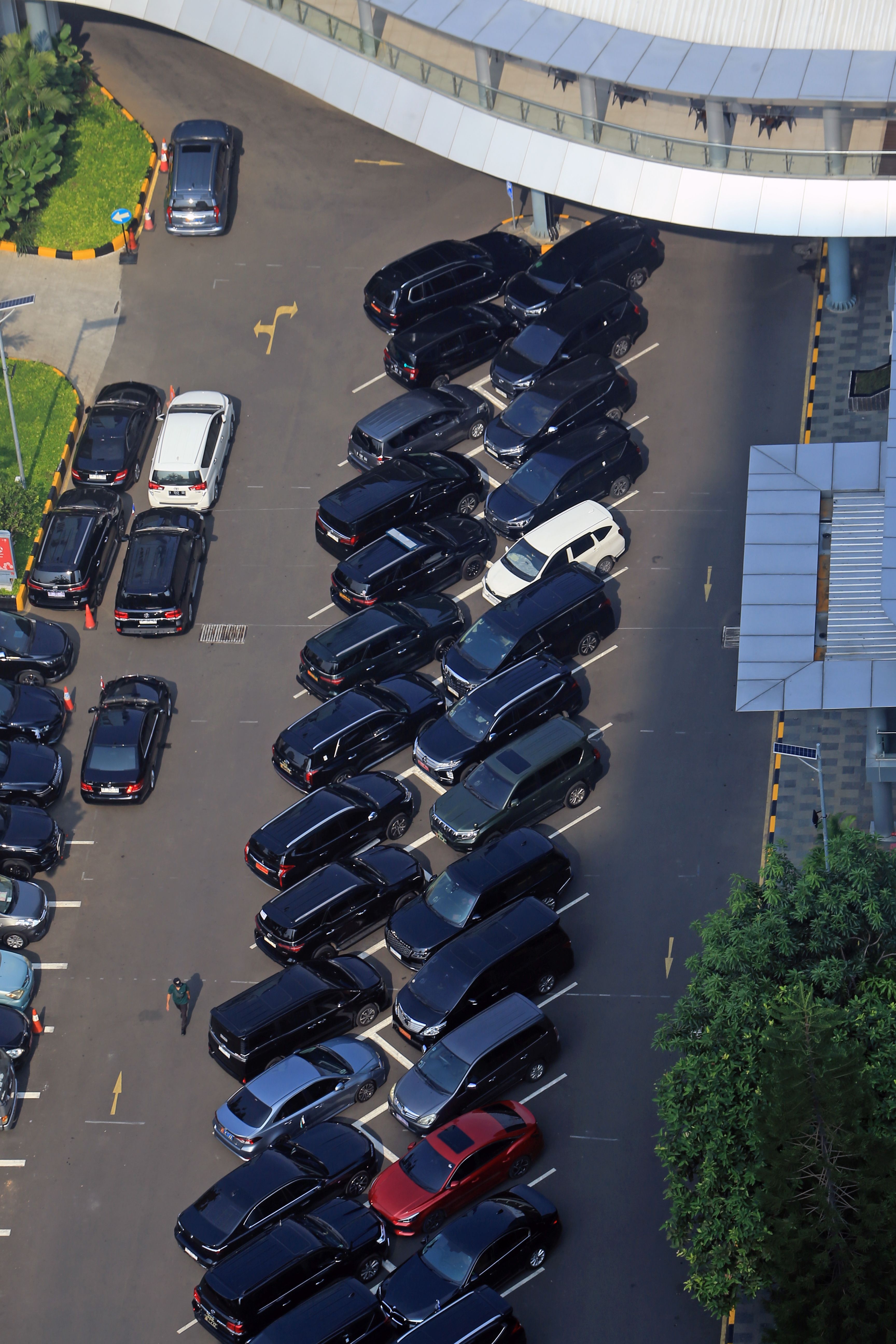 Aerial View of Urban Parking Lot with Cars · Free Stock Photo