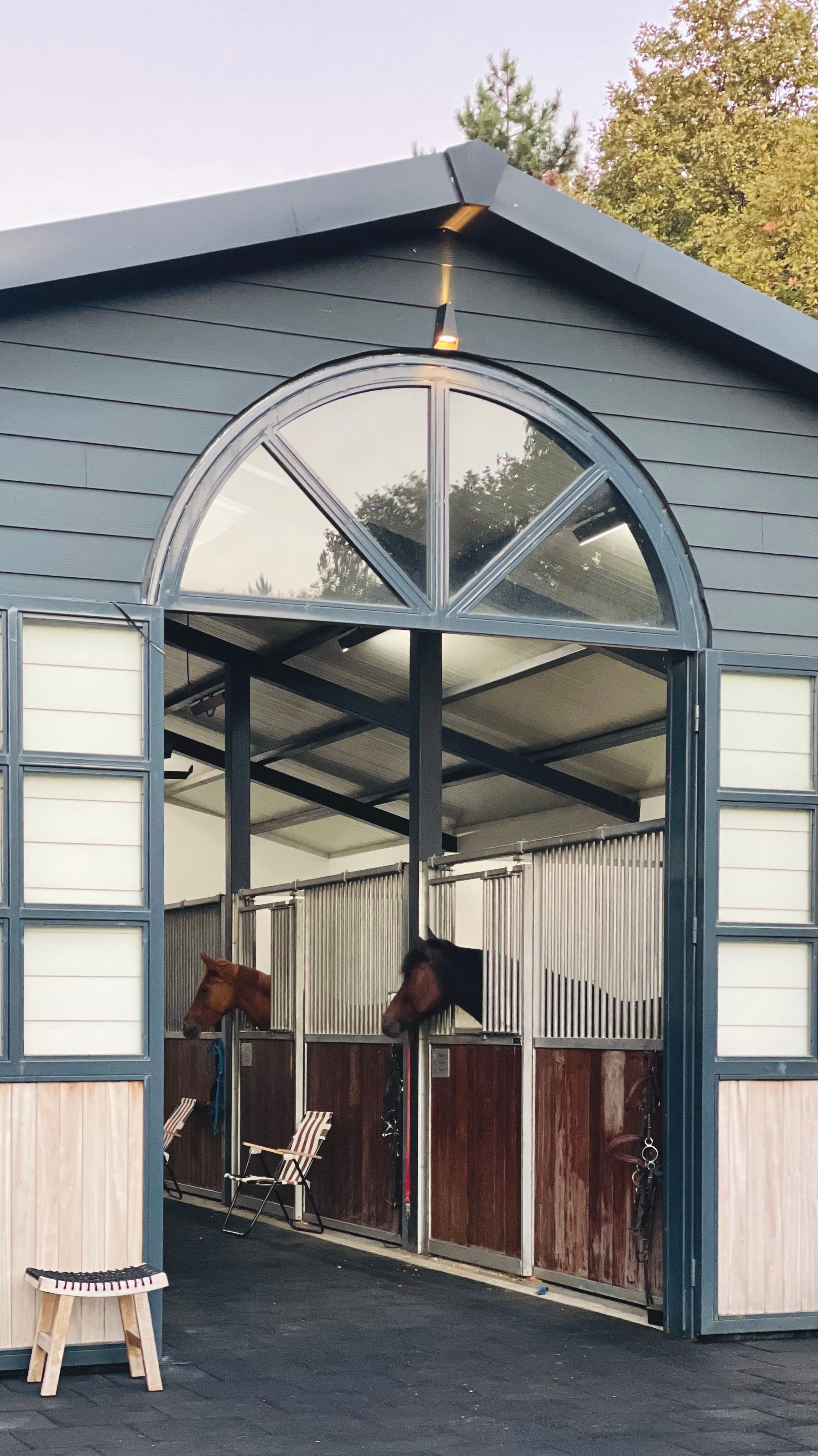 Modern Horse Stable with Open Door View · Free Stock Photo