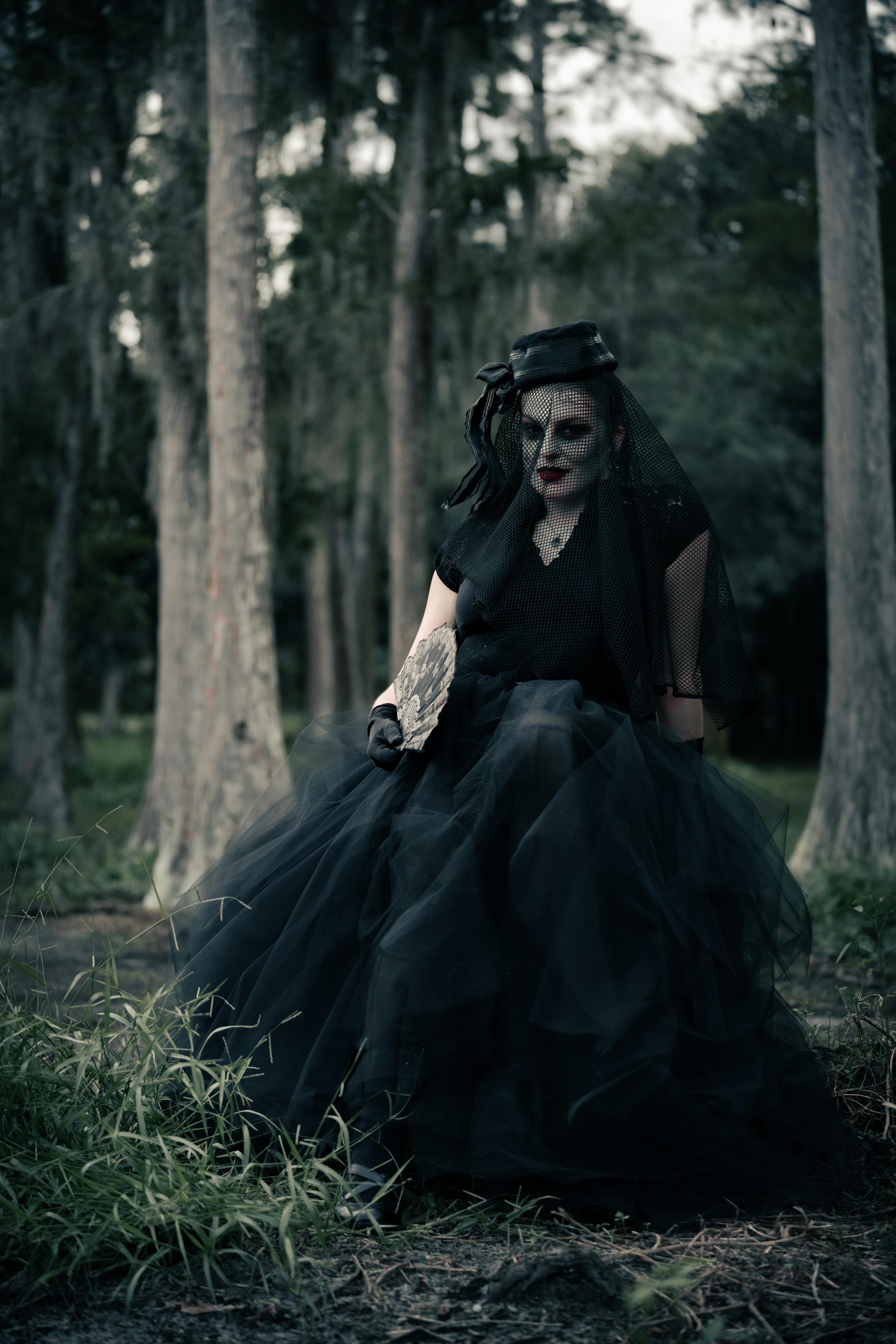 Gothic Woman in Forest Wearing Black Gown · Free Stock Photo