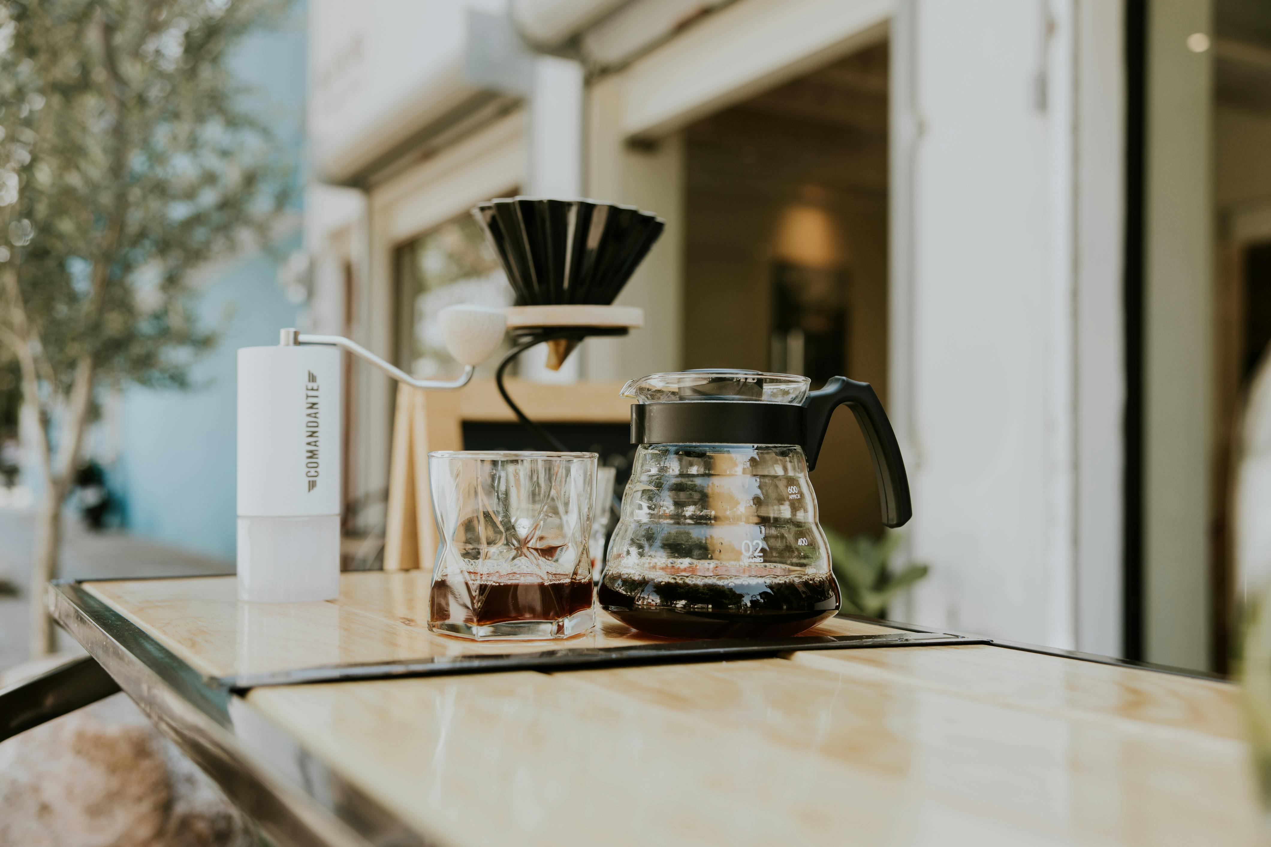 Modern Outdoor Café Coffee Setting · Free Stock Photo