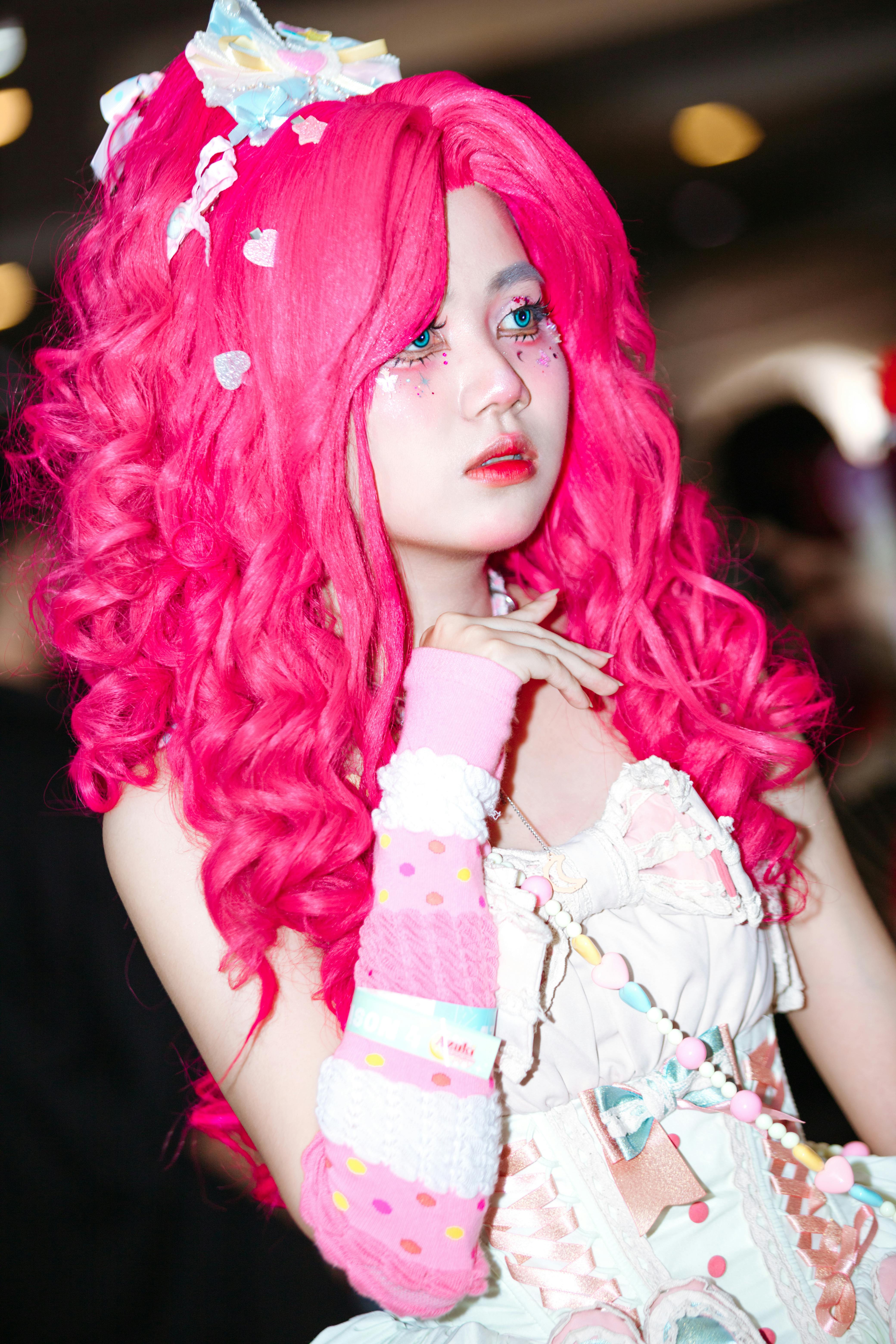 Vibrant Cosplay Portrait with Pink Hair · Free Stock Photo
