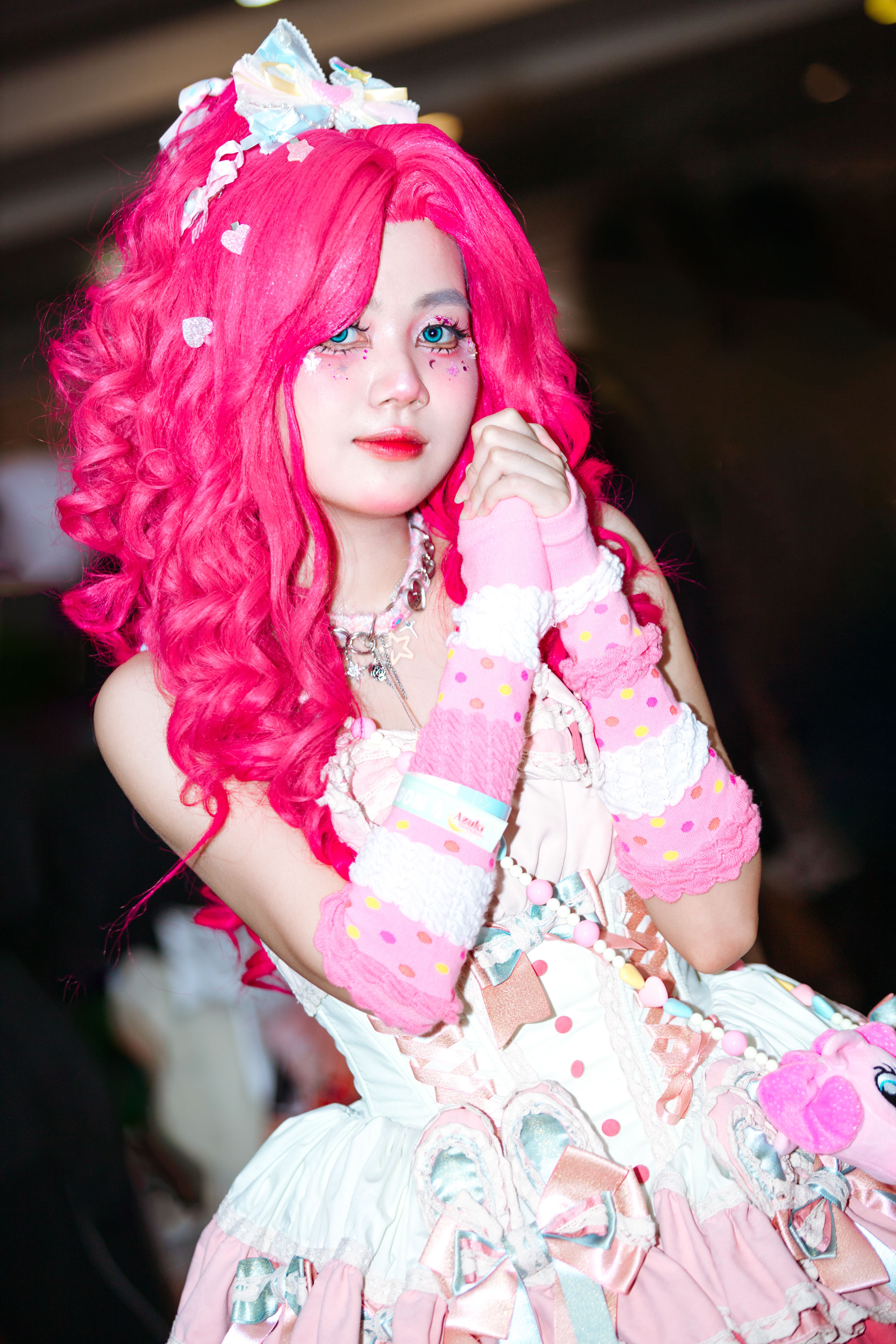 Vibrant Cosplay Fashion with Pink Hair · Free Stock Photo