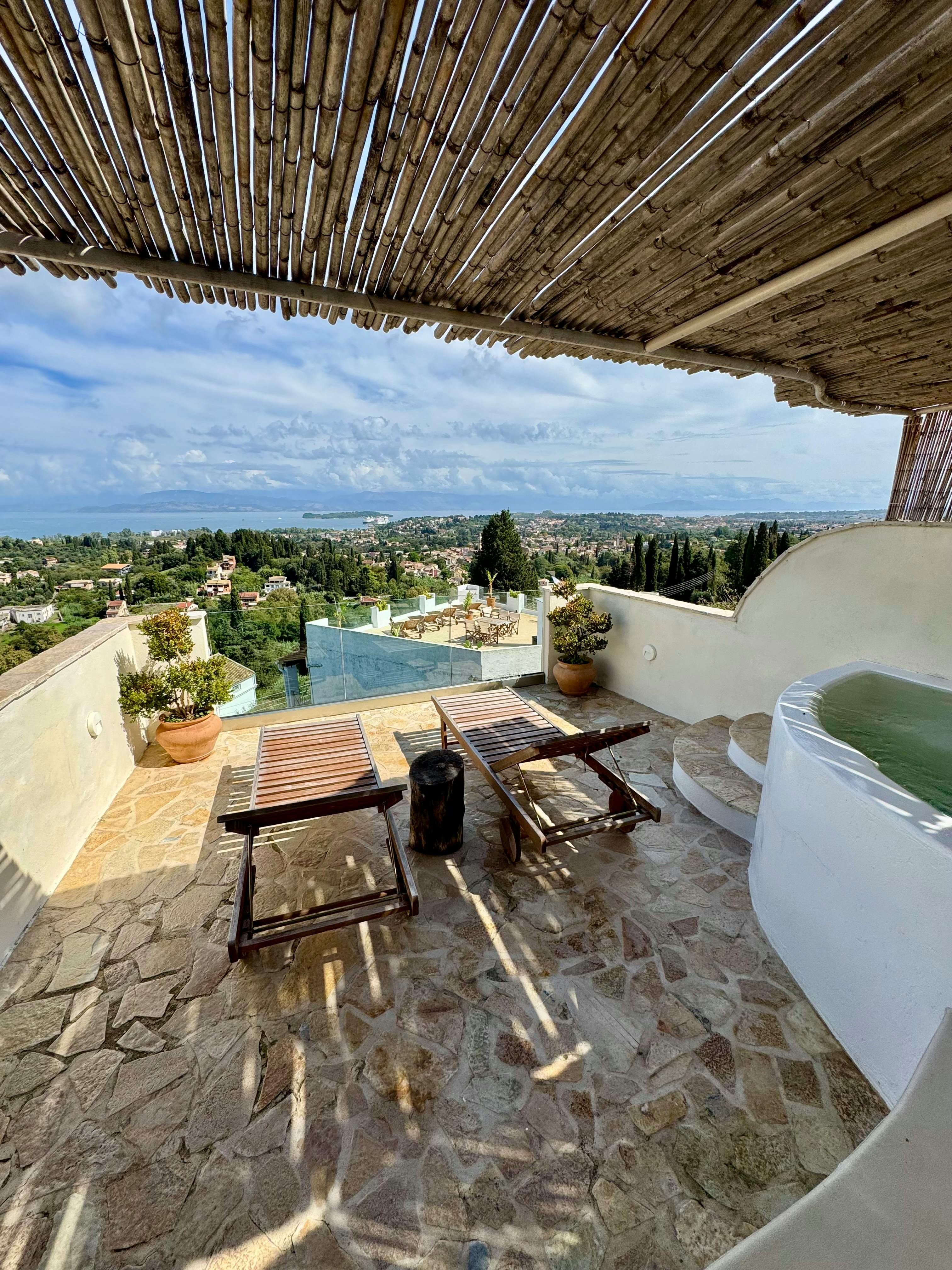 Scenic Mediterranean Rooftop Terrace with Ocean View · Free Stock Photo
