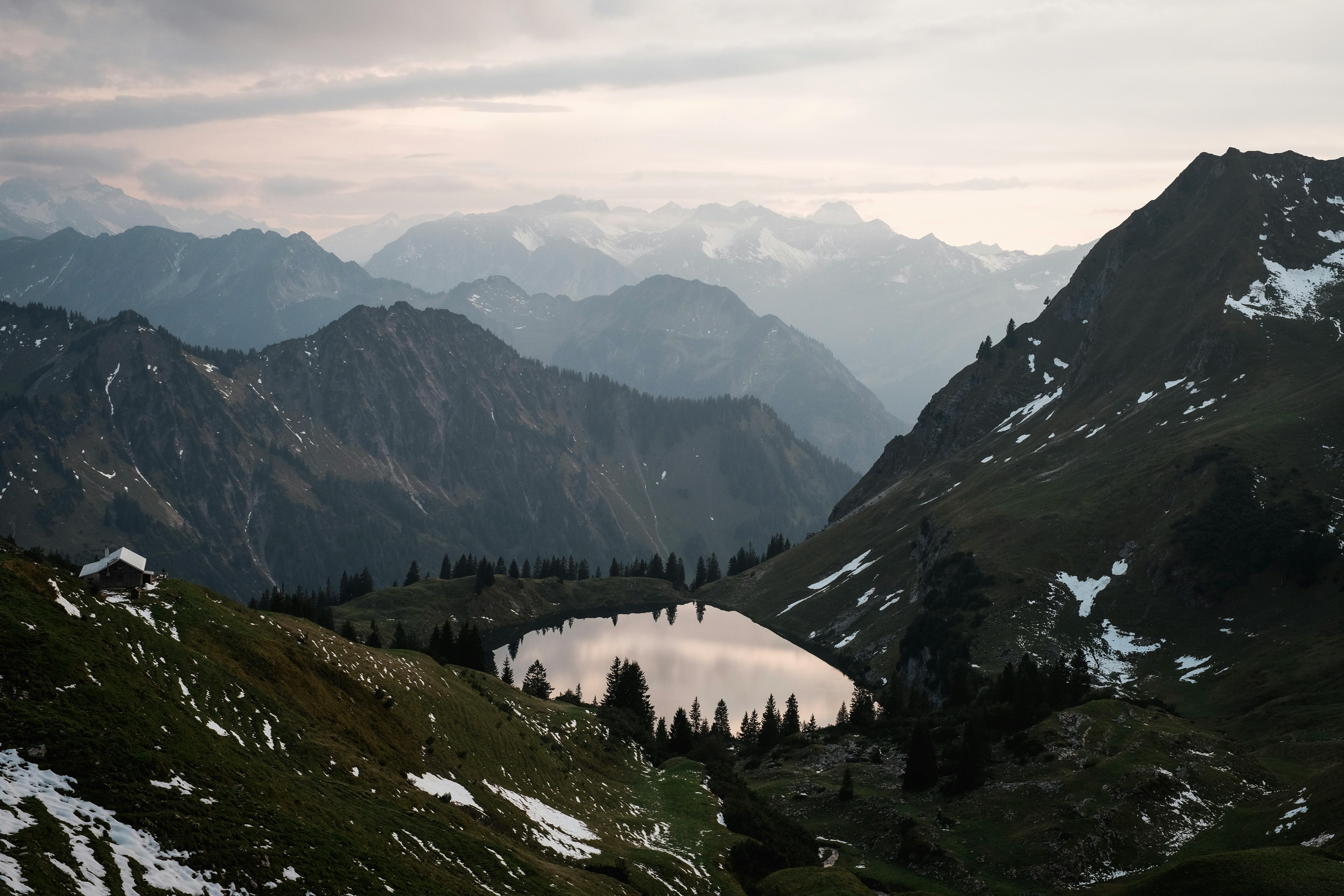 Tranquil Alpine Lake Reflection in Mountains · Free Stock Photo