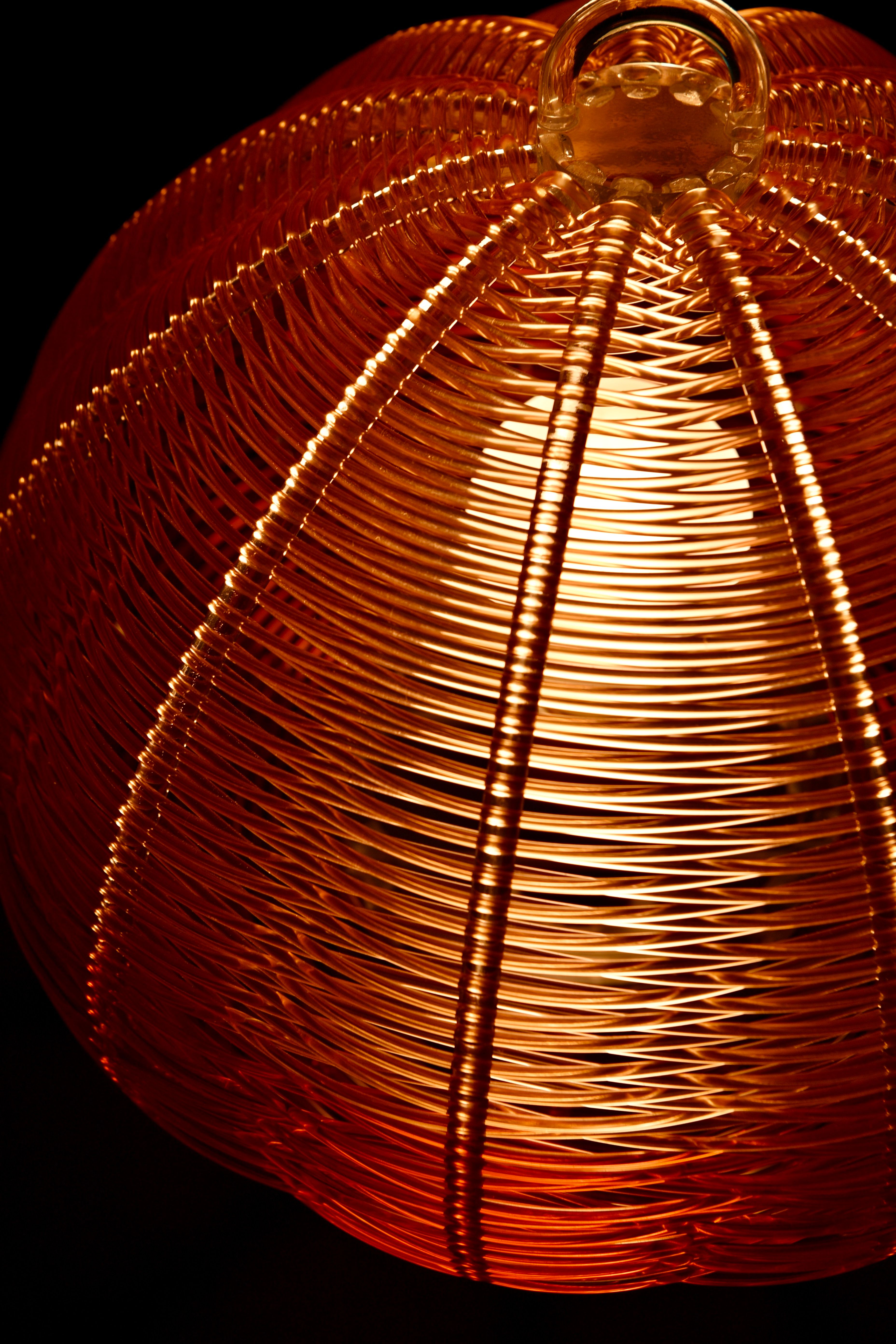 Artistic Golden Wire Lamp with Warm Illumination · Free Stock Photo