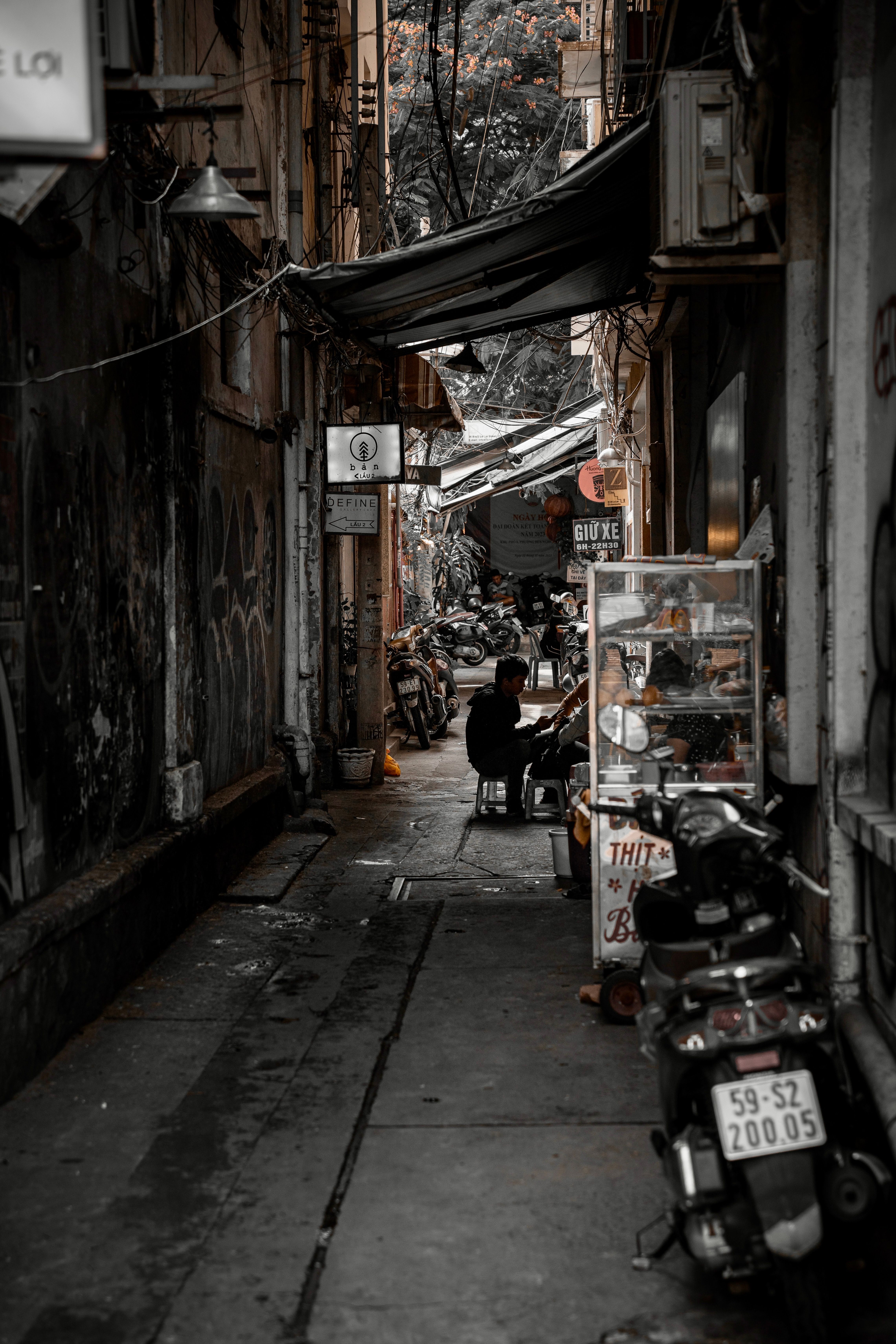 Narrow Urban Alleyway with Street Food Stalls · Free Stock Photo