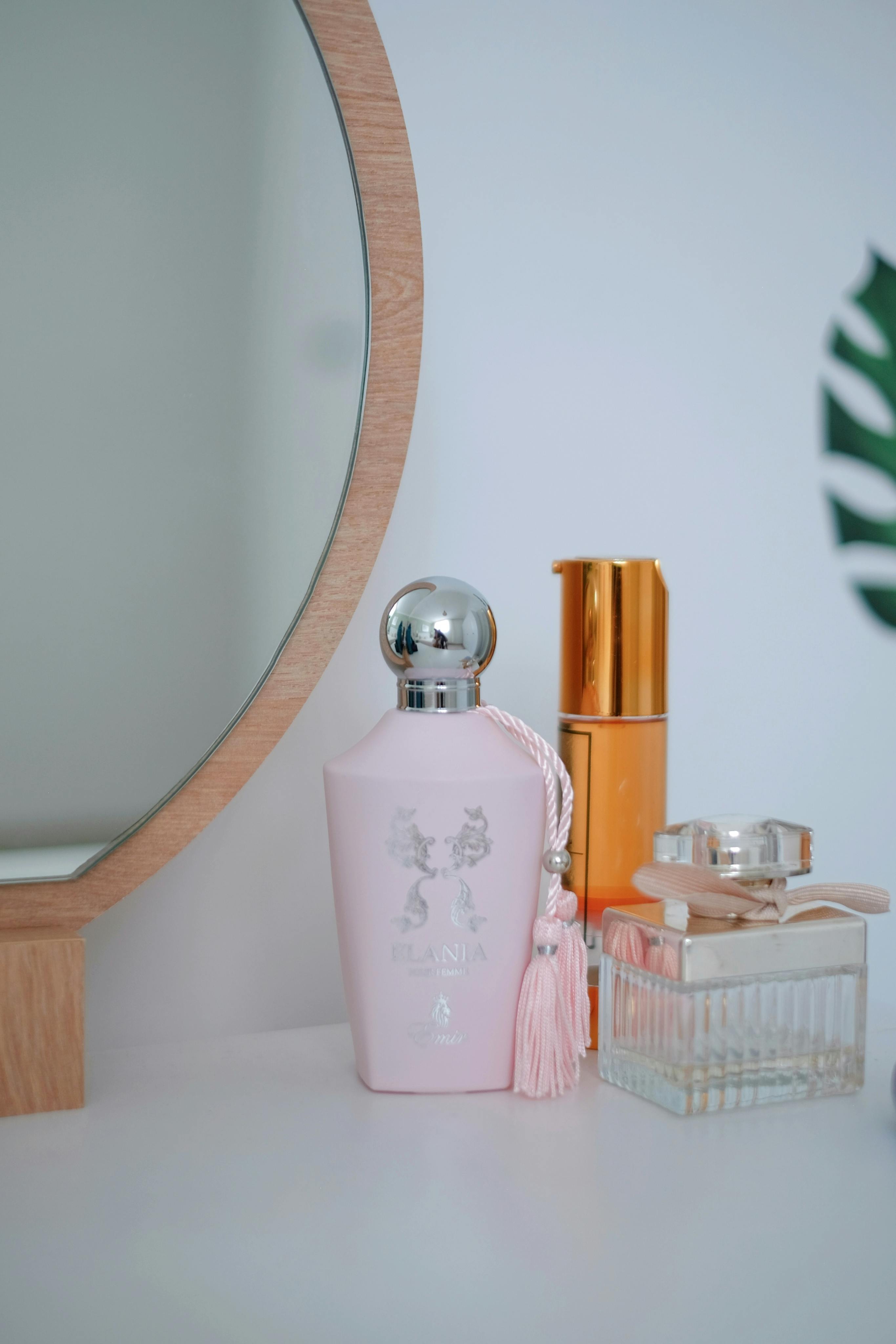 Elegant Vanity Setup with Perfume Bottles · Free Stock Photo