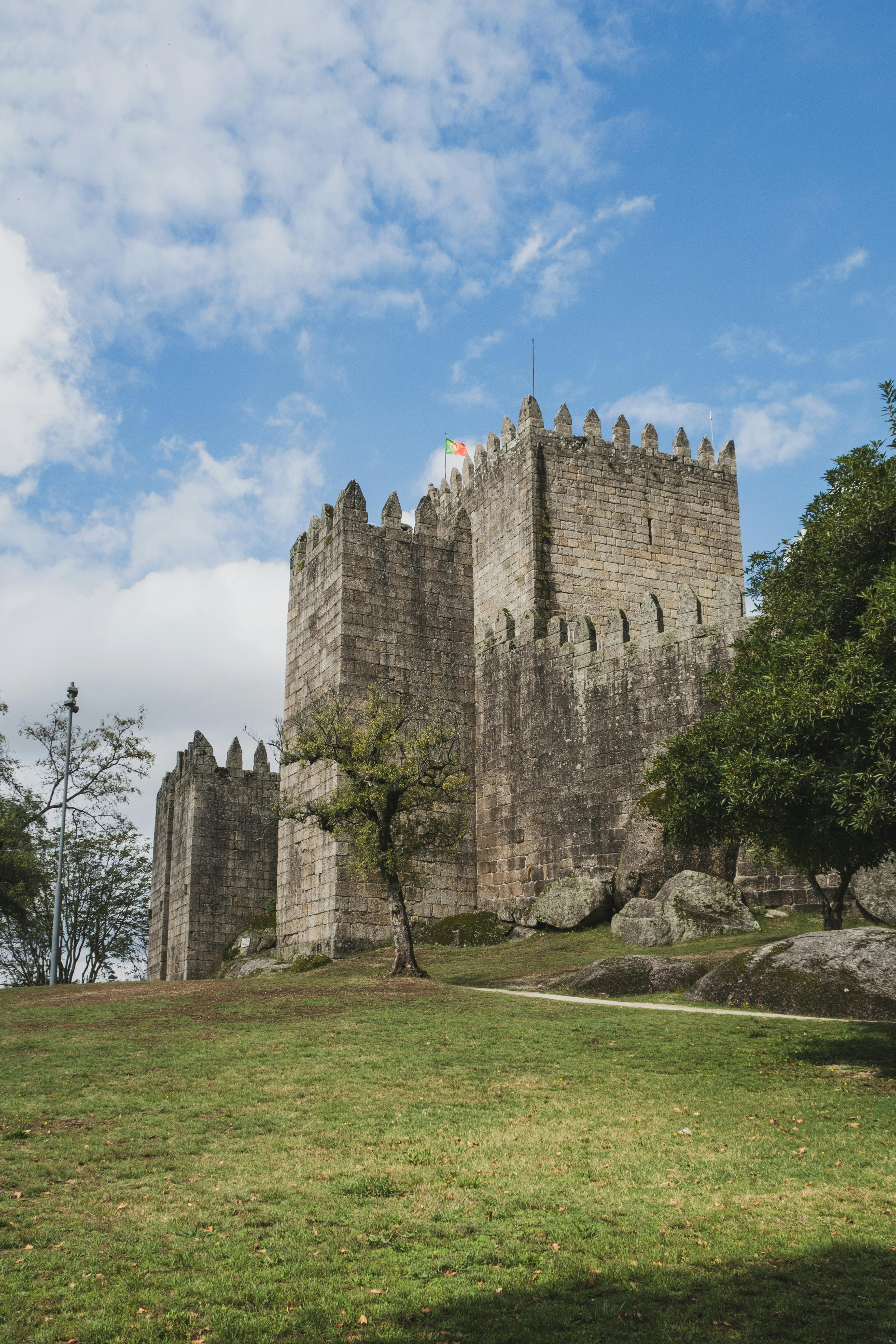 Majestic Medieval Castle Under a Blue Sky · Free Stock Photo