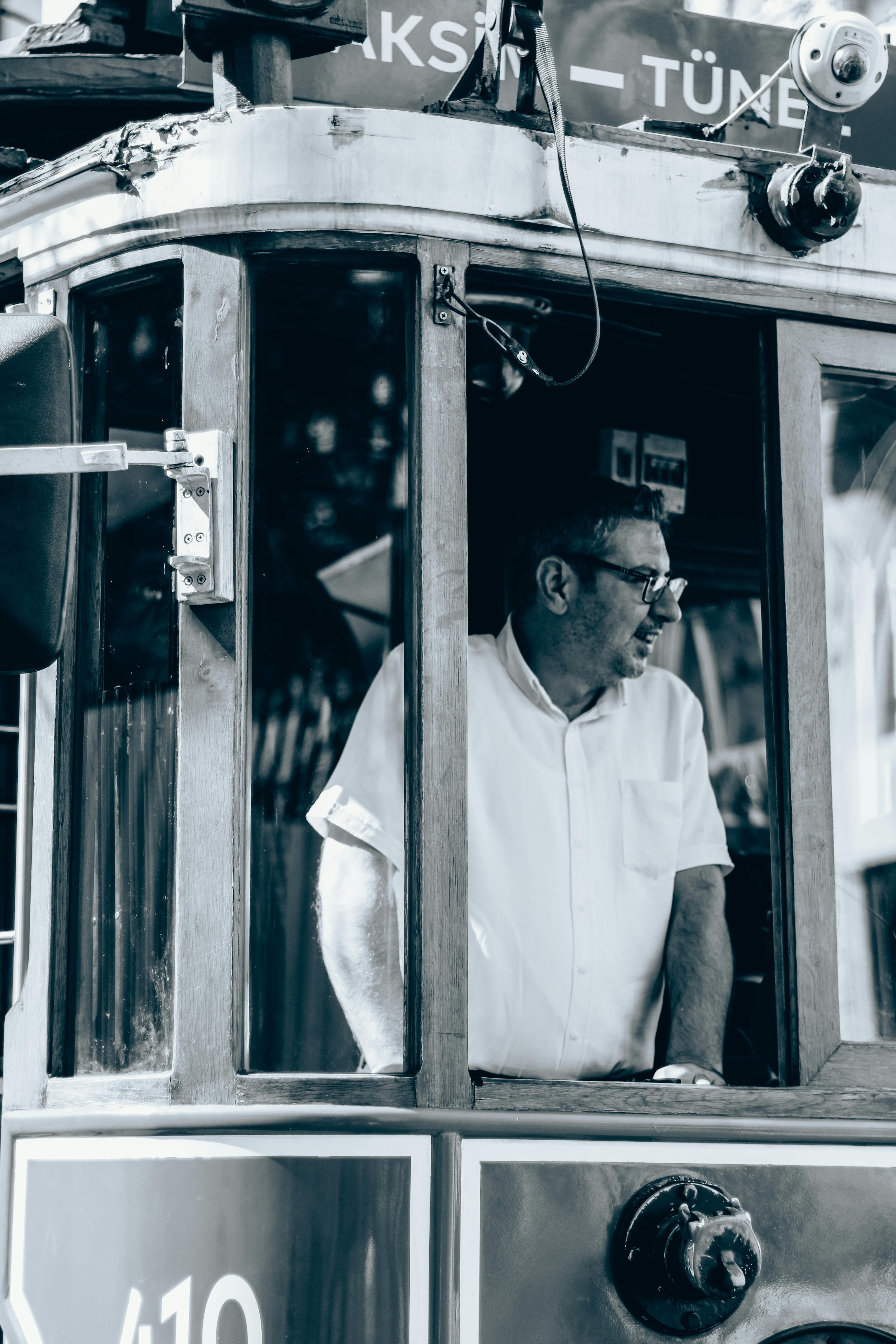 Vintage Tram Driver in Istanbul Street Scene · Free Stock Photo