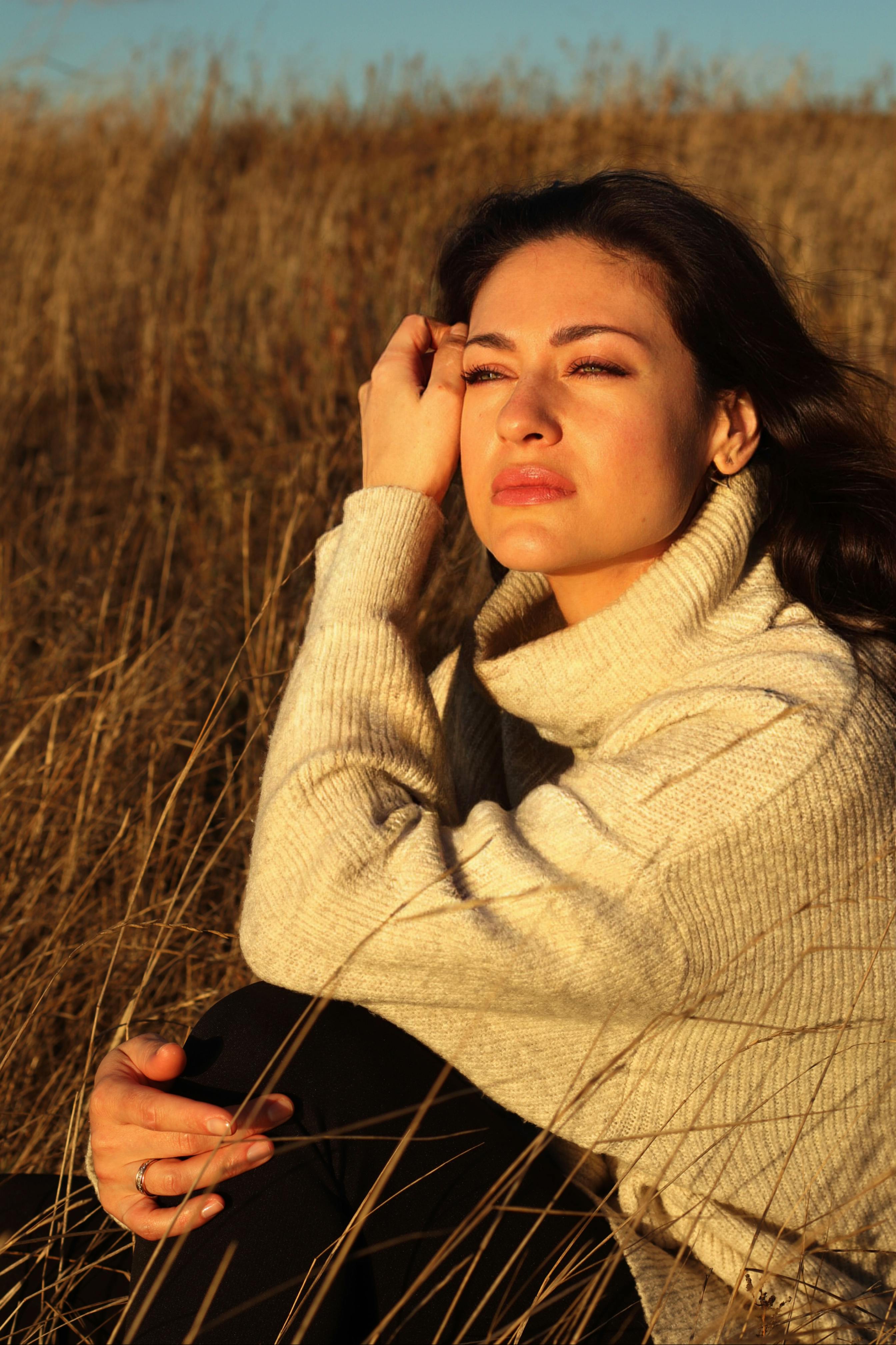 Woman Relaxing in Peaceful Autumn Field · Free Stock Photo