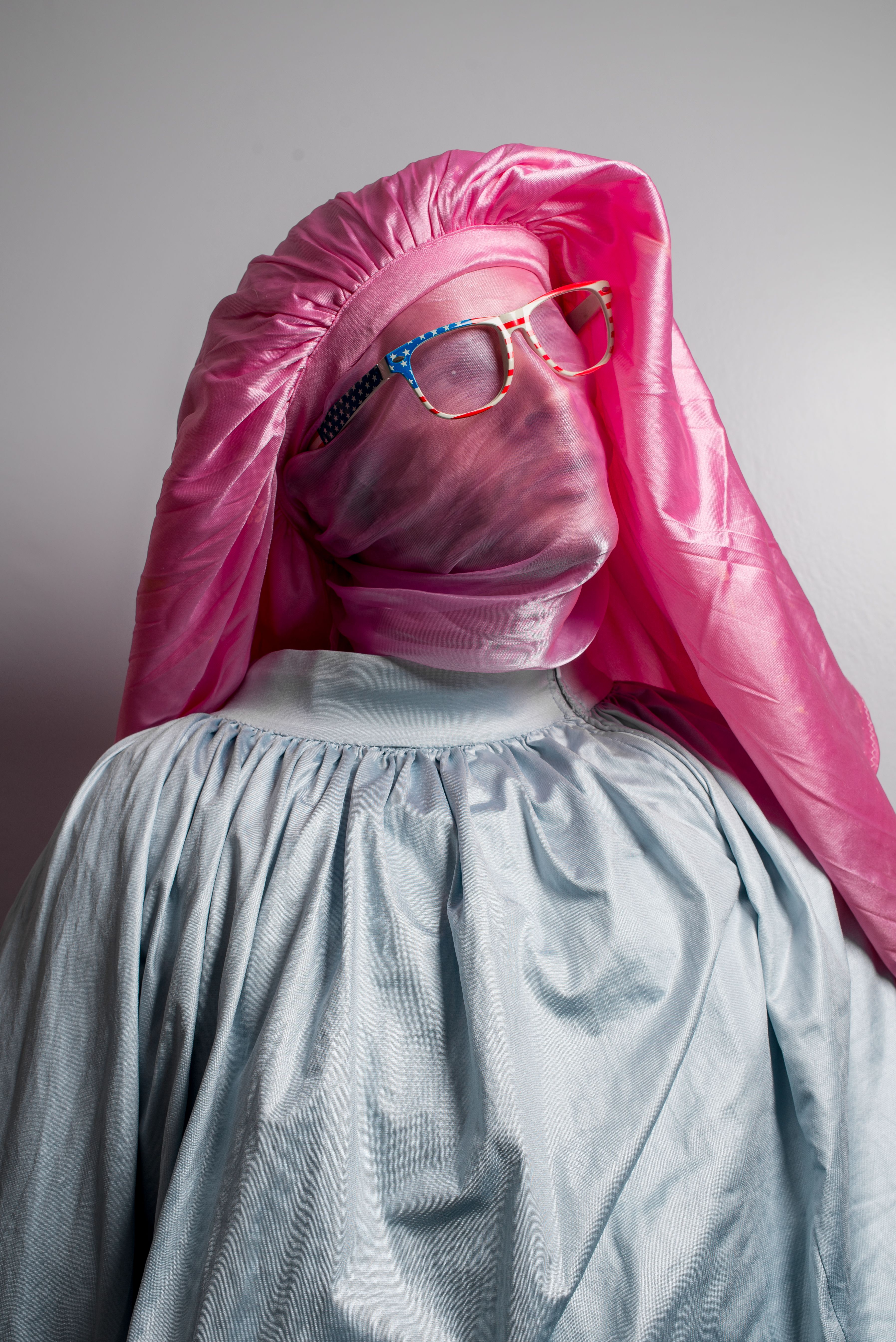 Person Covering Face with a Red Cloth · Free Stock Photo