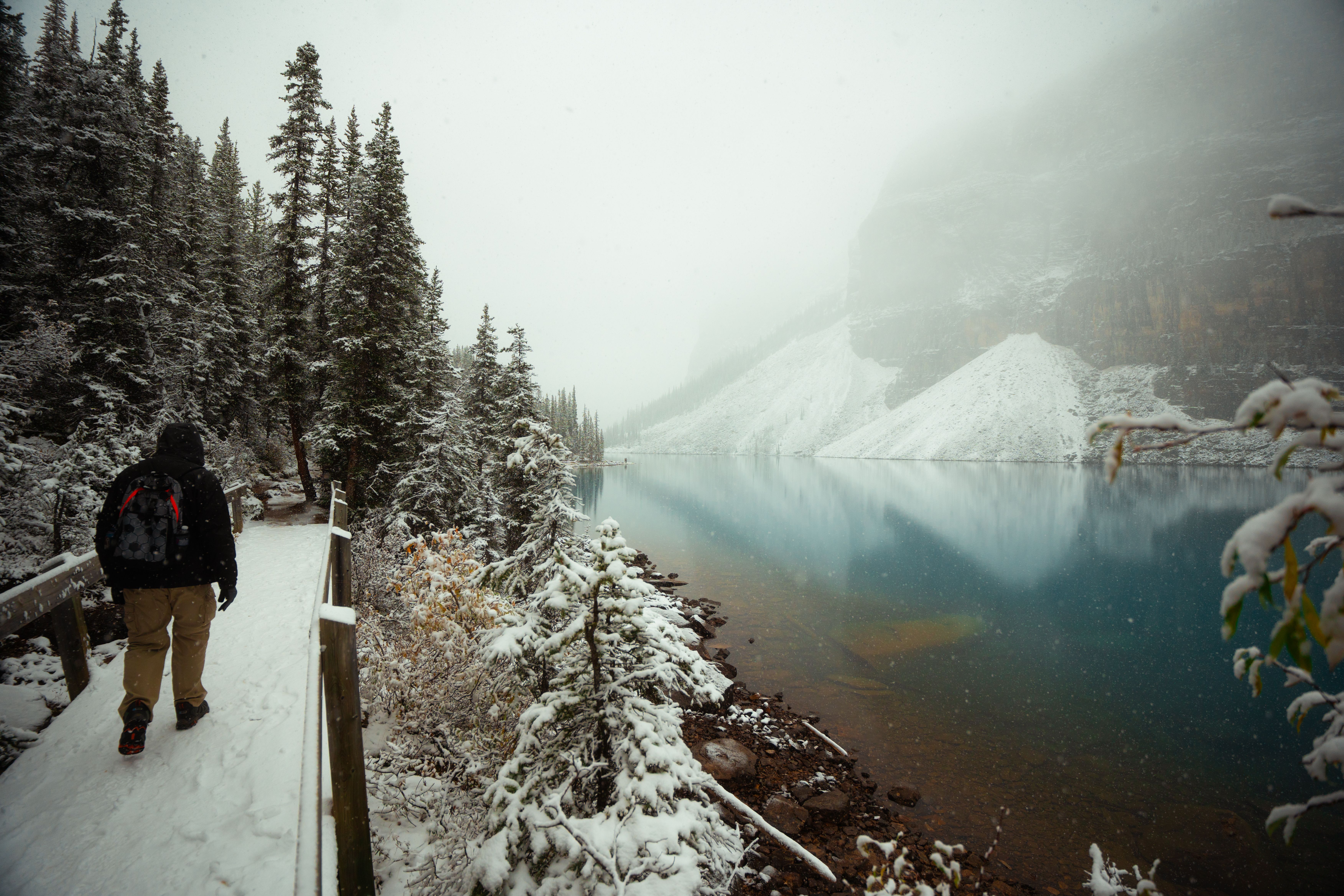 Winter Hike Around Serene Snowy Lake Landscape · Free Stock Photo