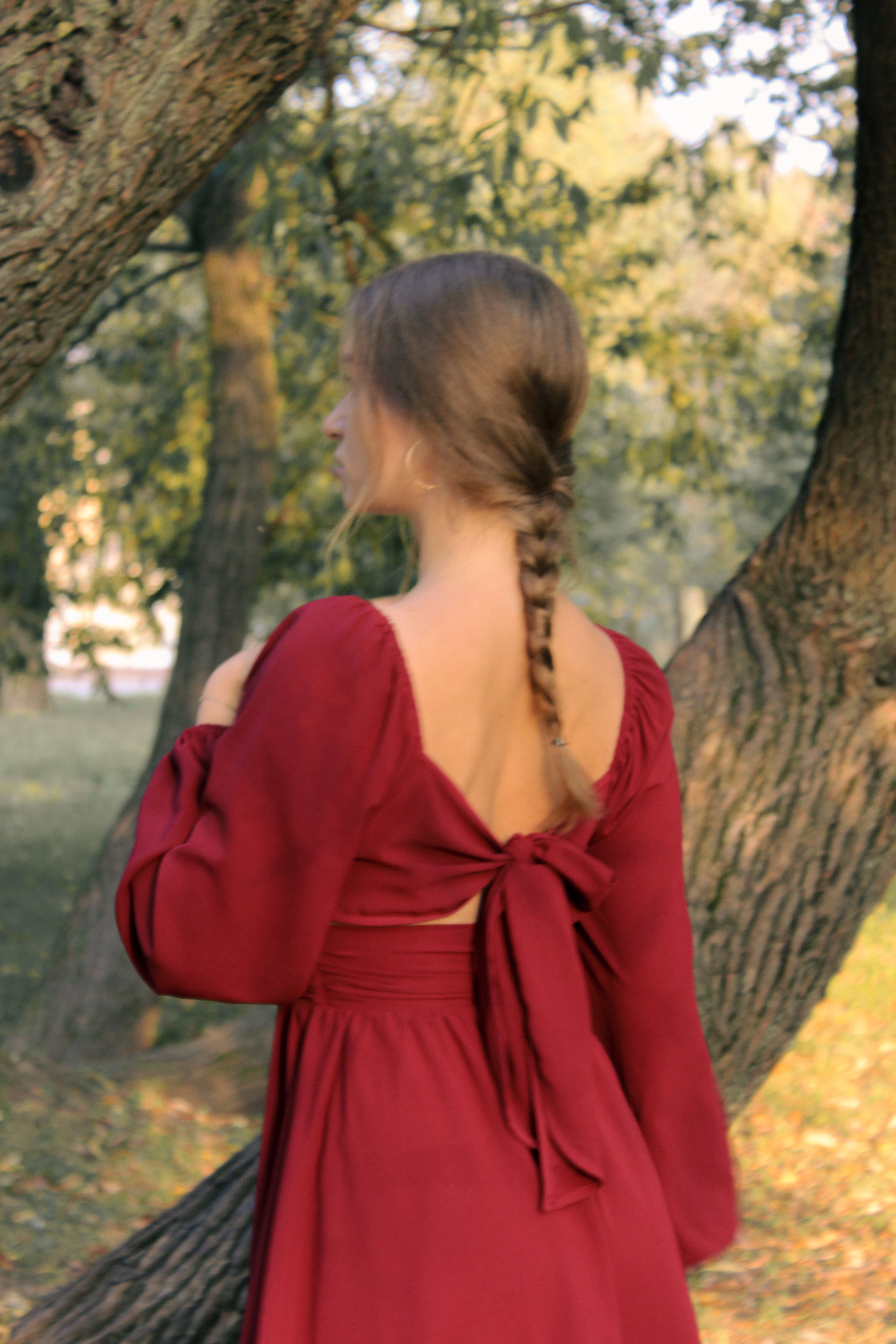 Woman in Red Dress in Forest Setting · Free Stock Photo