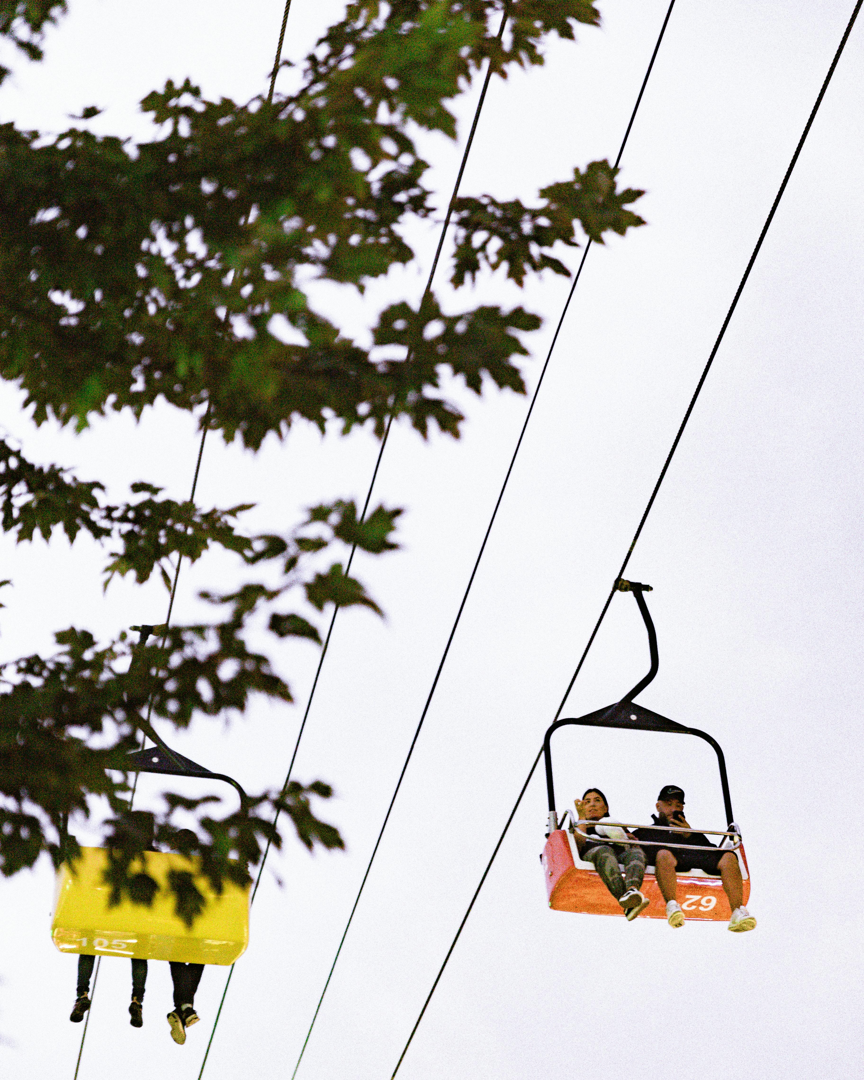 Two Person Riding Cable Car · Free Stock Photo