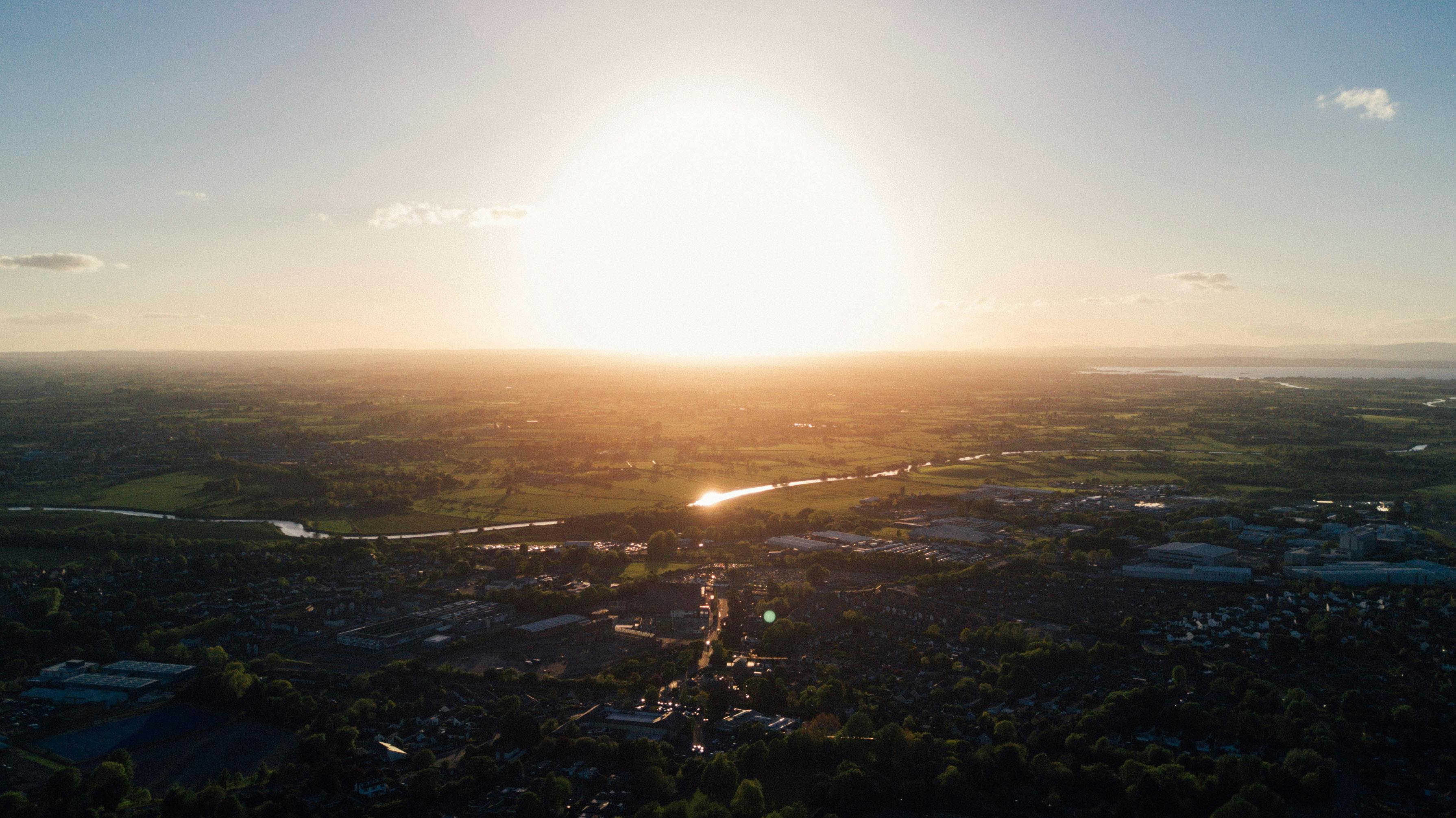 City and River under Sunset Sky · Free Stock Photo
