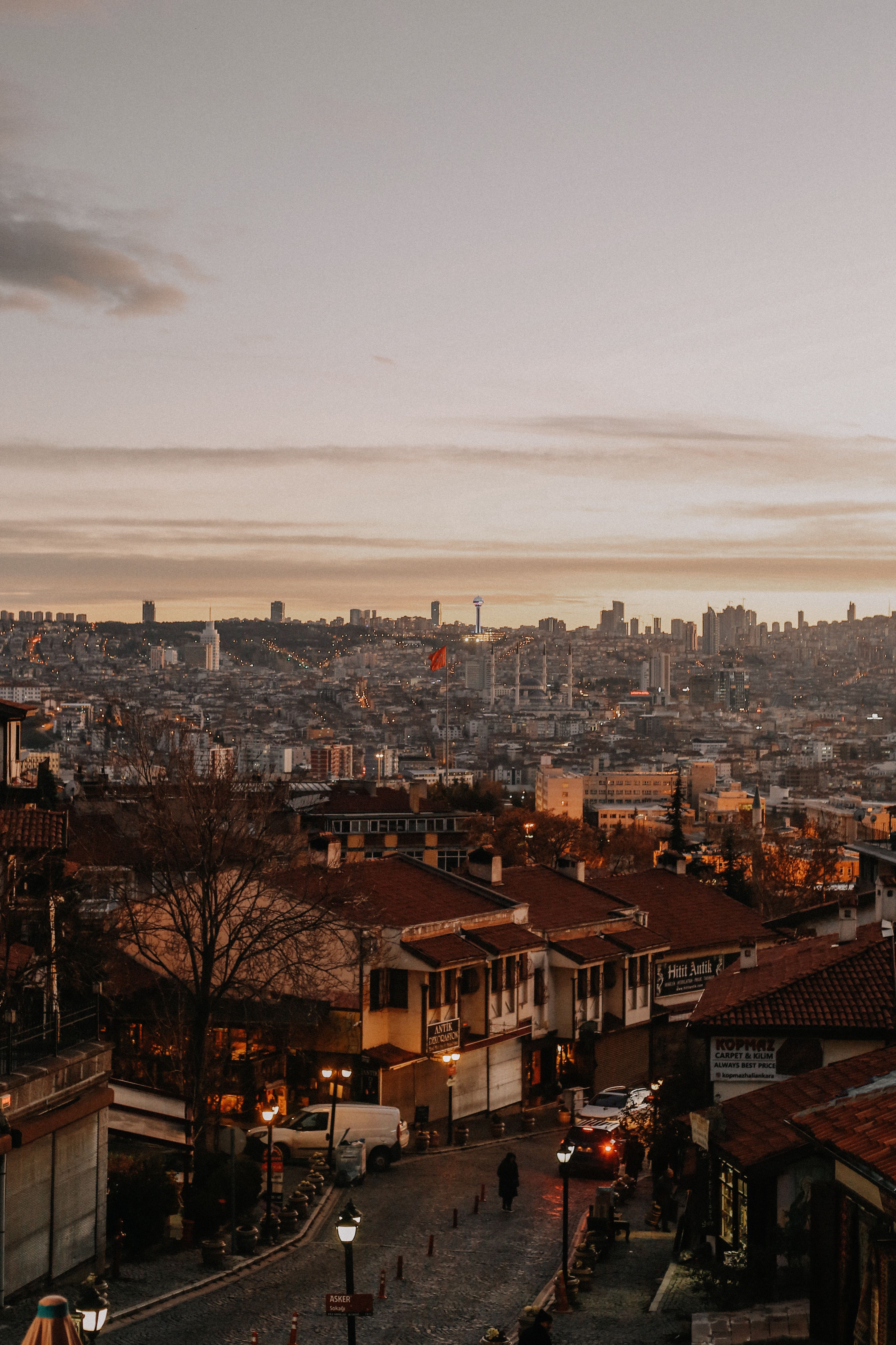 Sunset View of Urban Landscape from Hilltop · Free Stock Photo