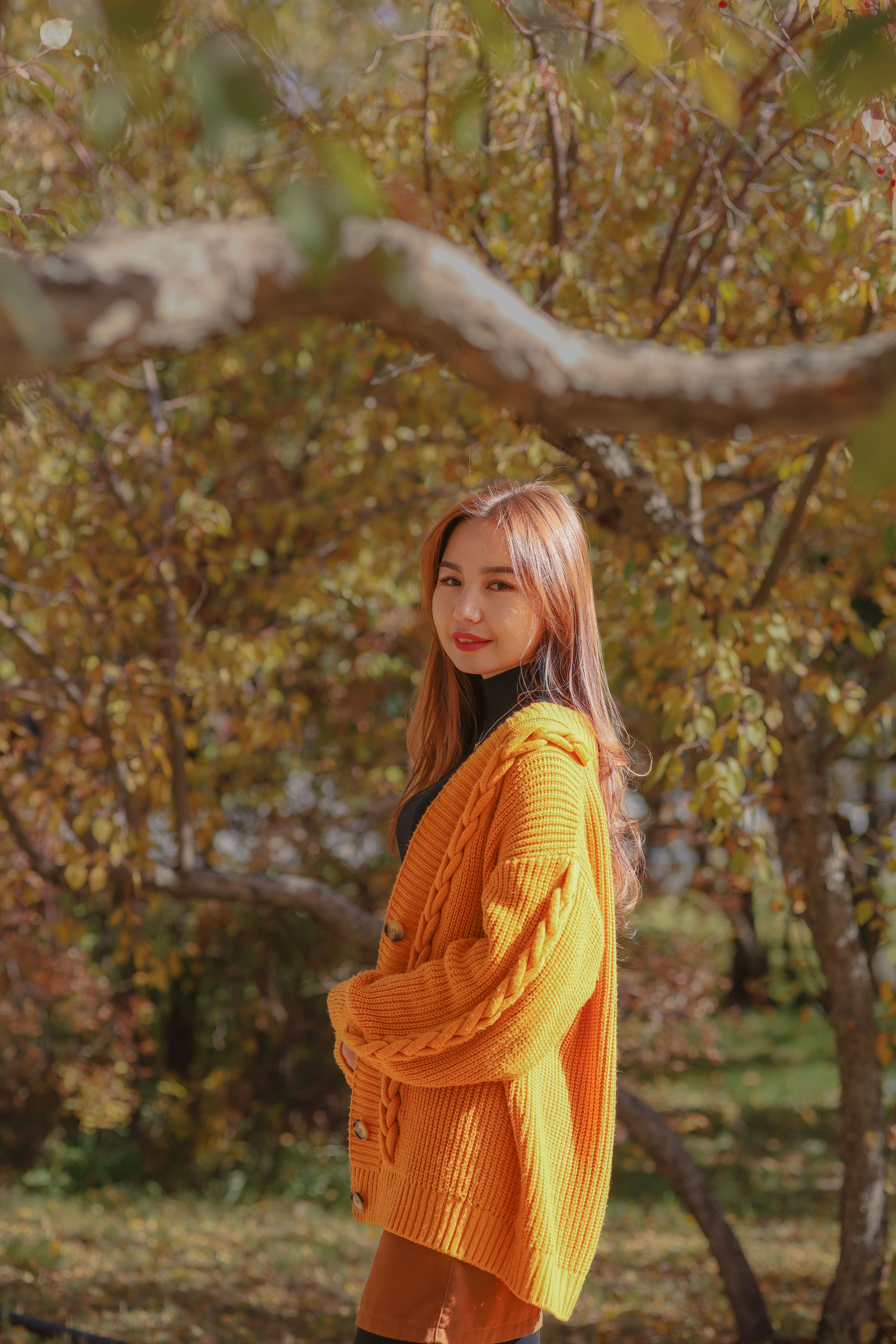 Autumn Portrait with Golden Leaves and Warm Knitwear · Free Stock Photo