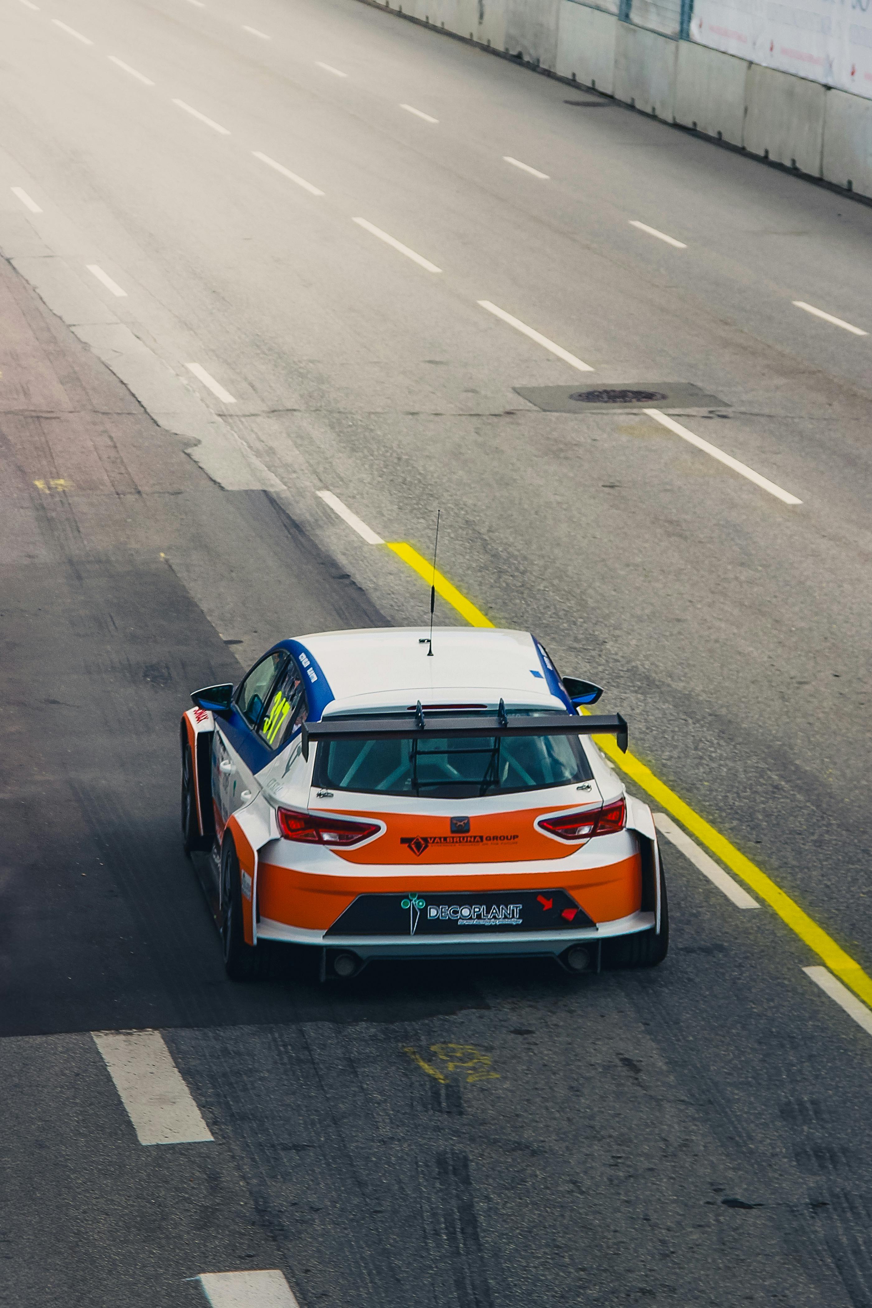 Professional Race Car on Copenhagen Track · Free Stock Photo