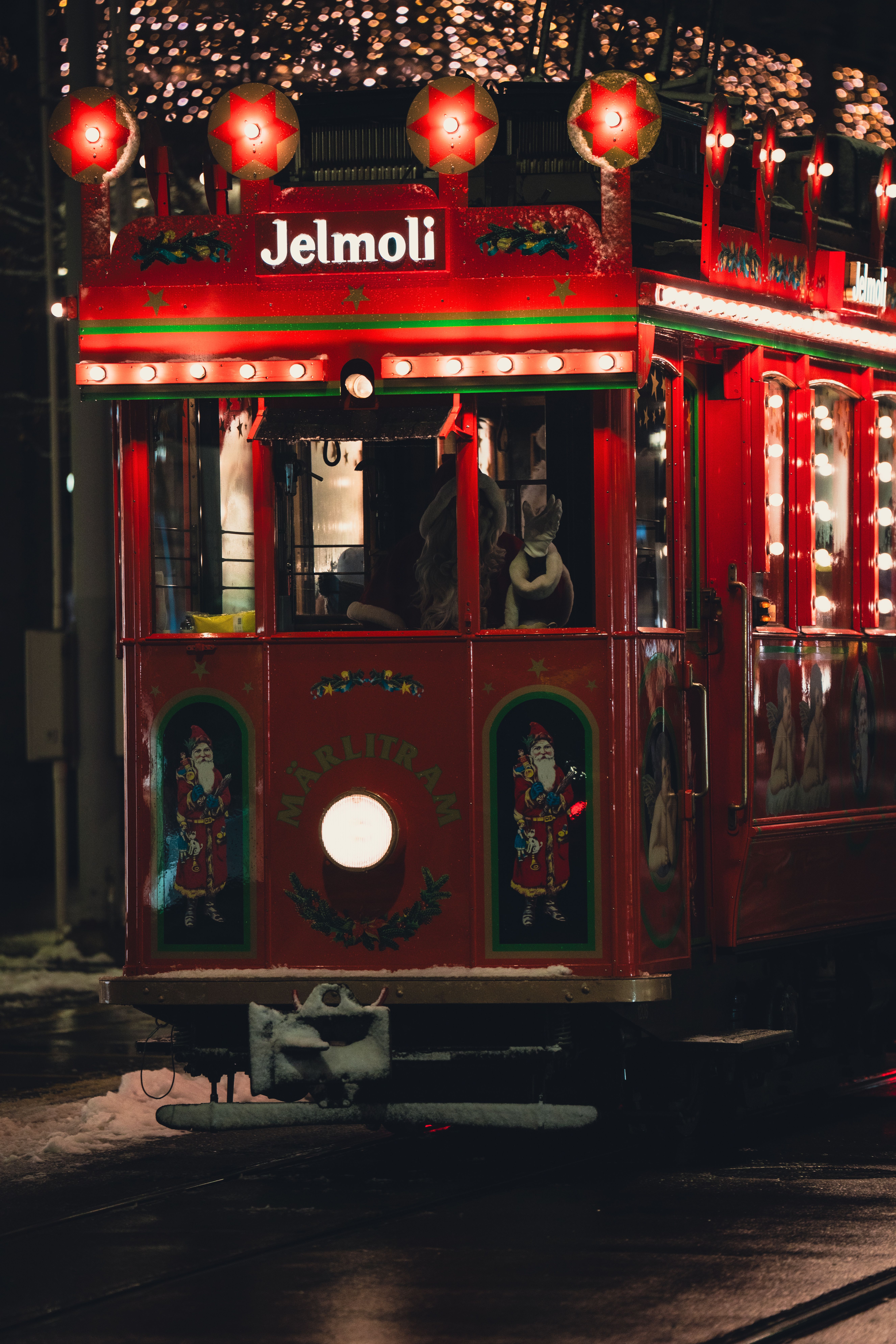 Festive Red Tram Illuminated at Night in Zurich · Free Stock Photo