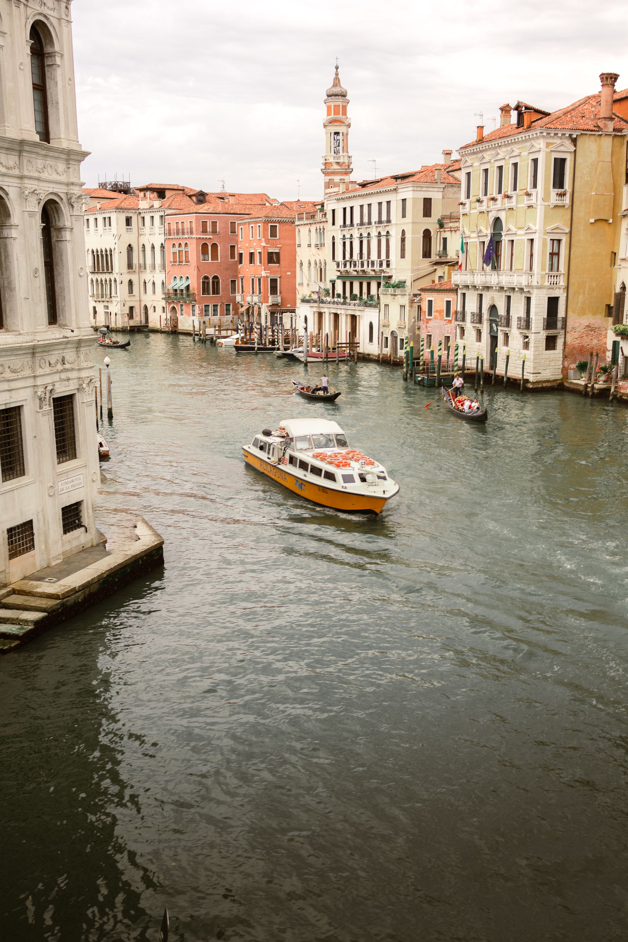 Scenic View of Venice Canal with Gondolas · Free Stock Photo