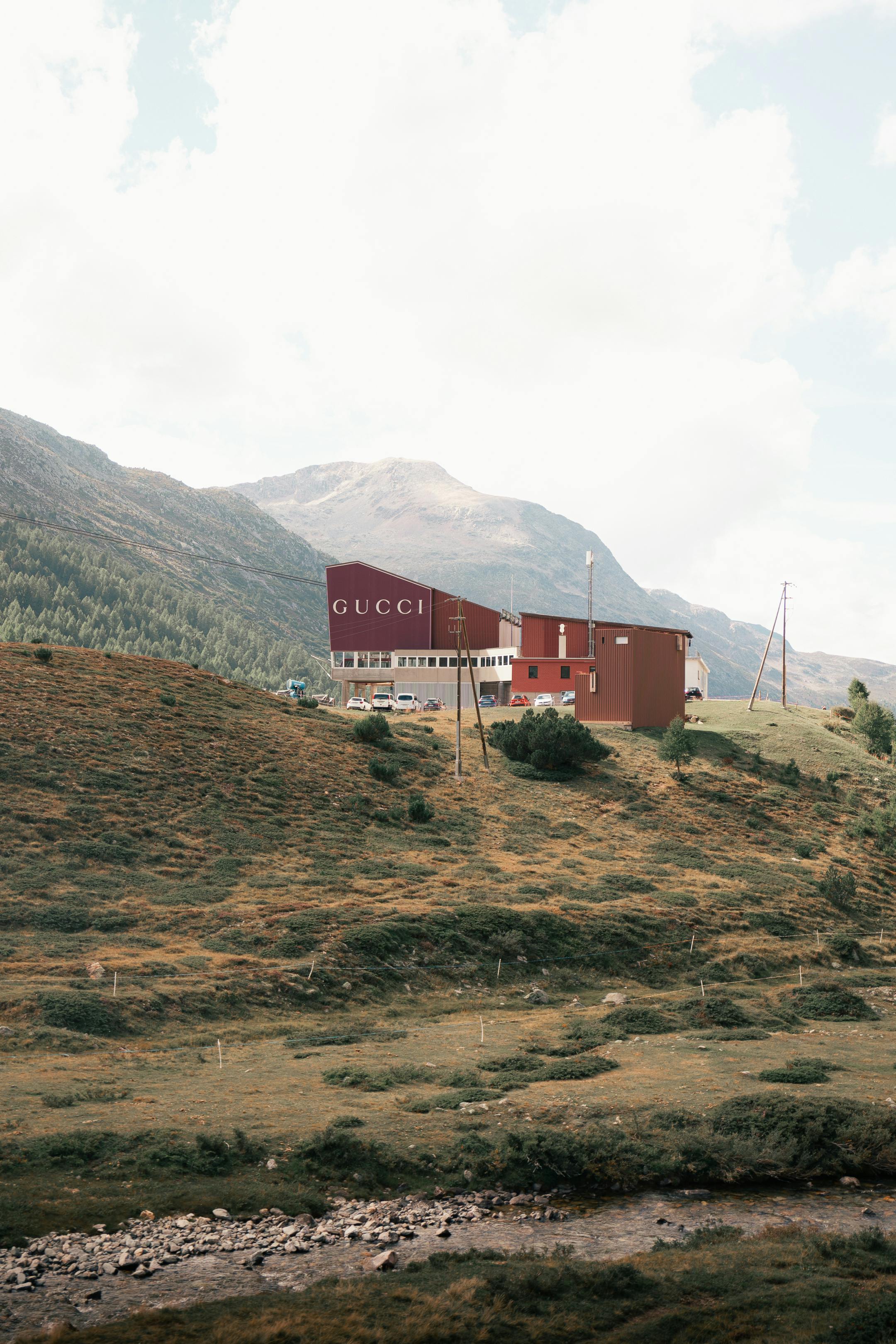 Scenic View of Gucci Building in Swiss Alps · Free Stock Photo