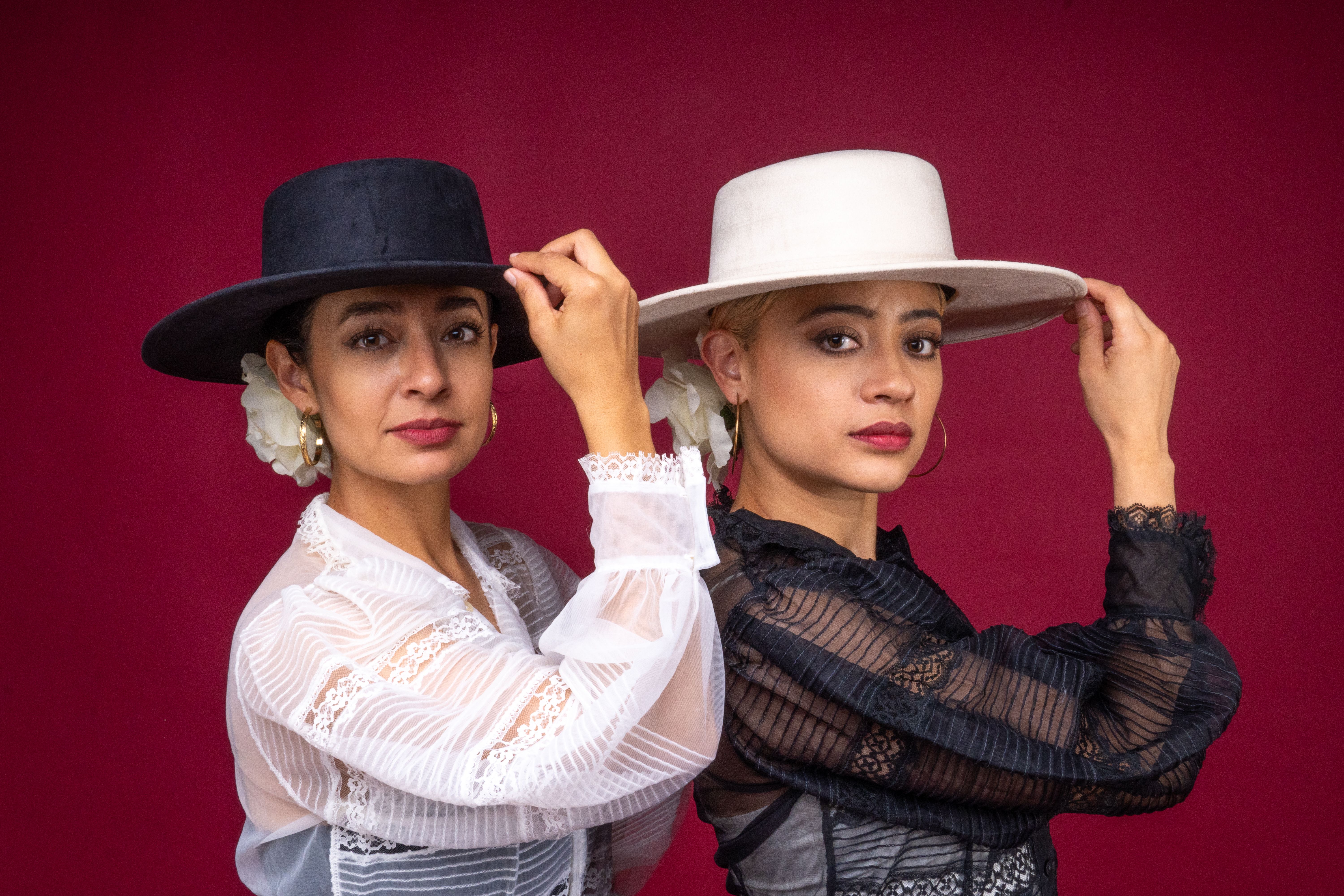 Elegant Flamenco Dancers in Traditional Attire · Free Stock Photo
