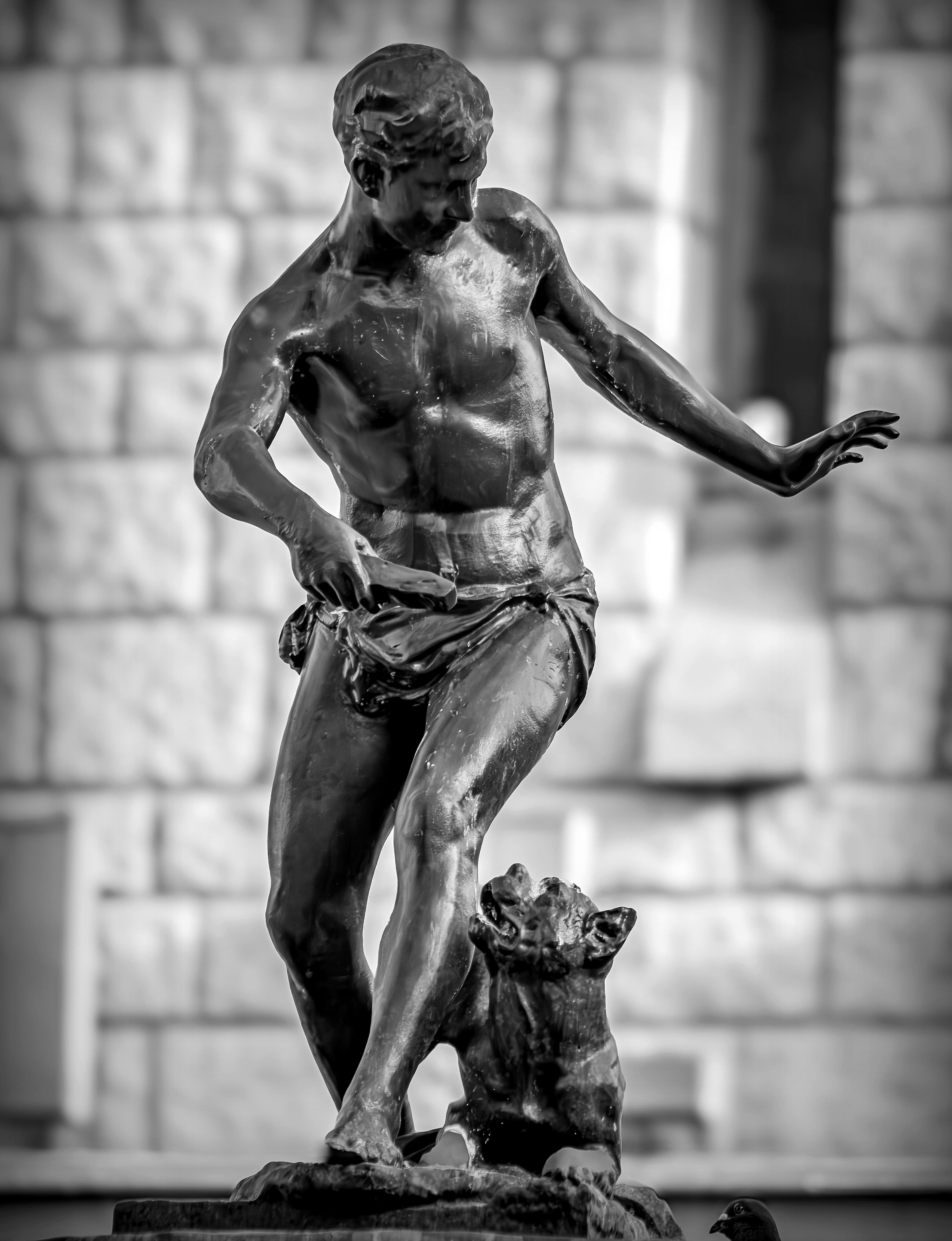 Man Standing in Front of Statue Photo · Free Stock Photo
