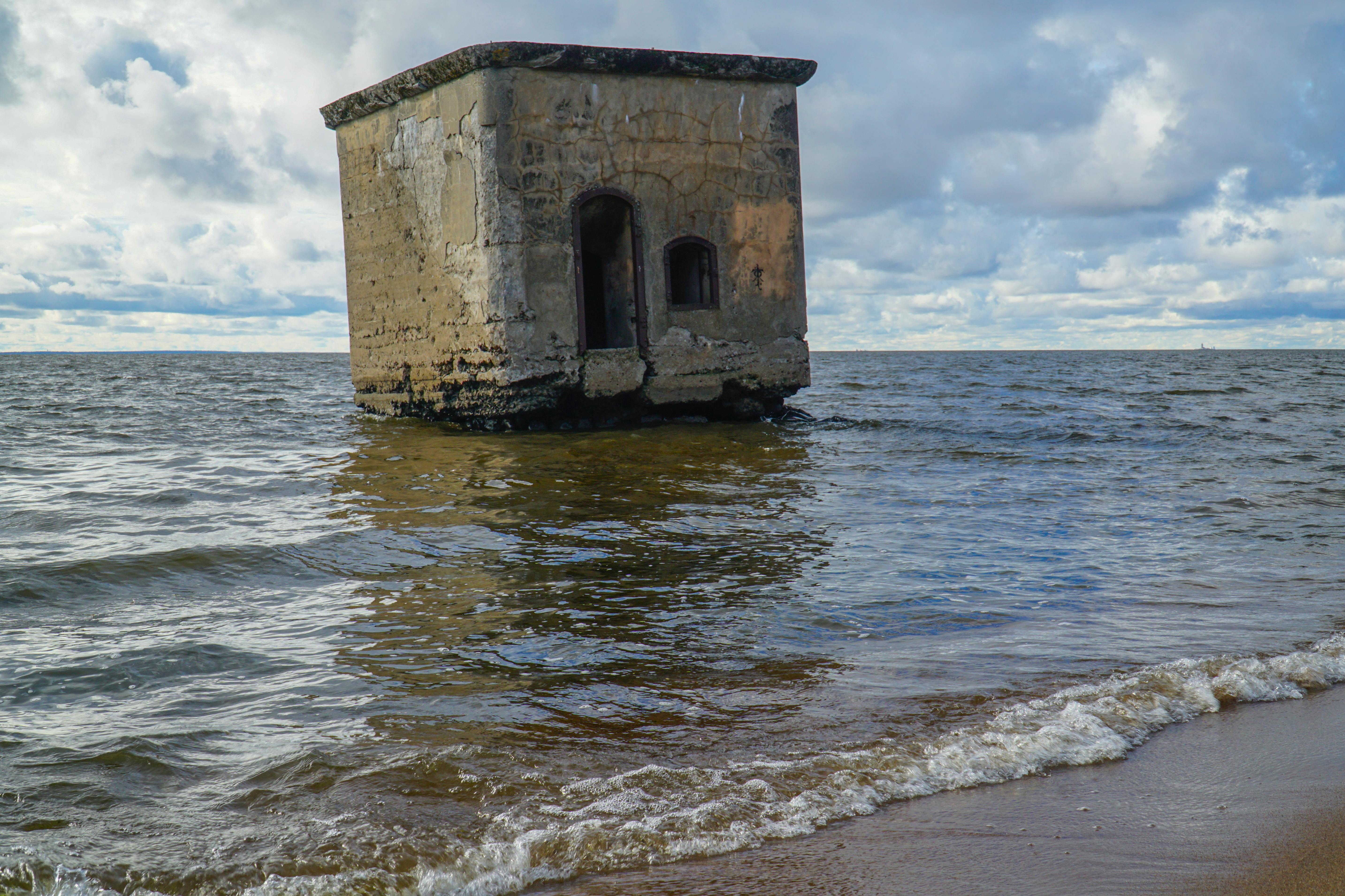 Historic Stone Structure in Ocean Waters · Free Stock Photo