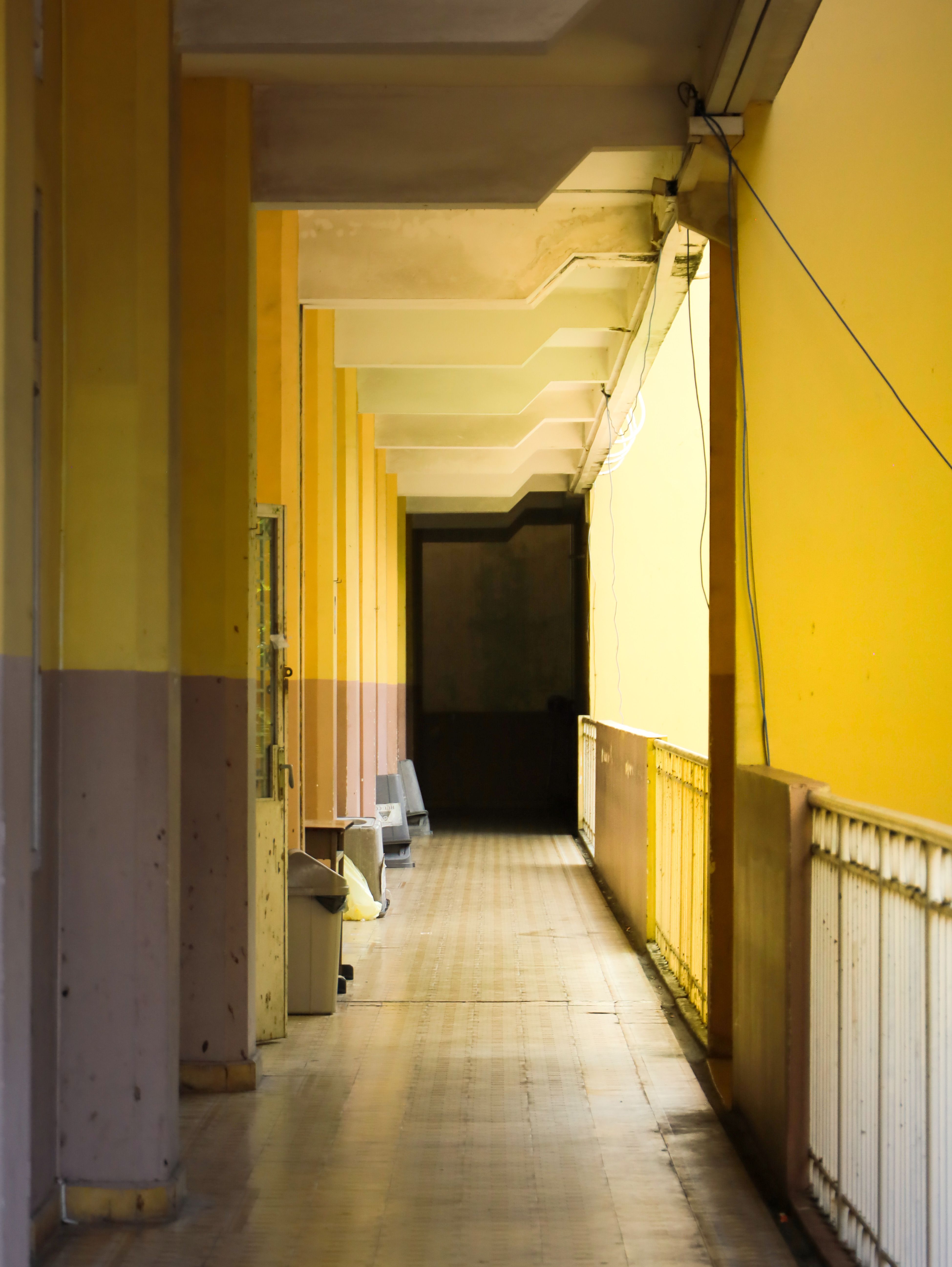 Quiet School Corridor with Natural Light · Free Stock Photo