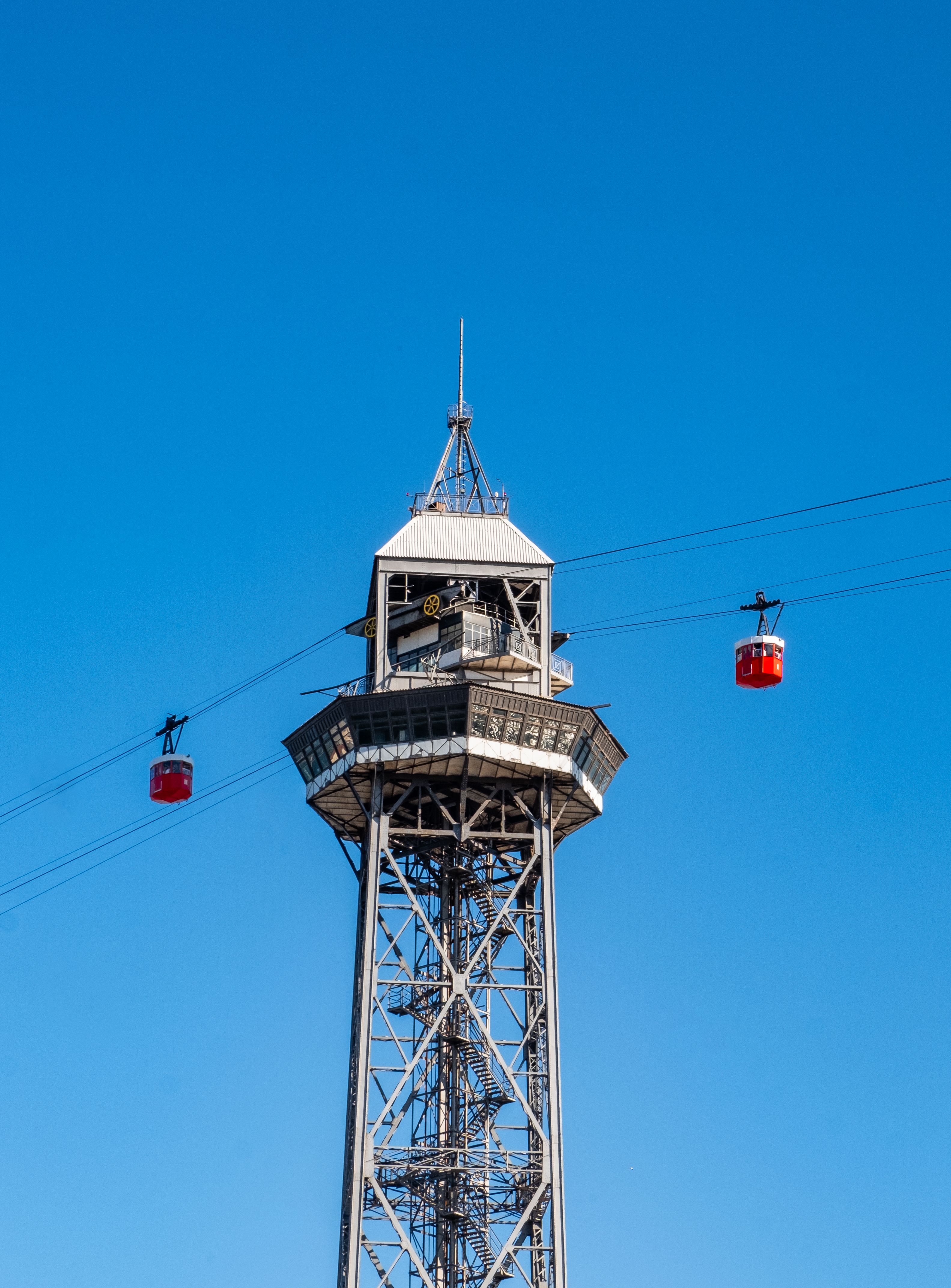 Barcelona Cable Car Tower Against Clear Blue Sky · Free Stock Photo