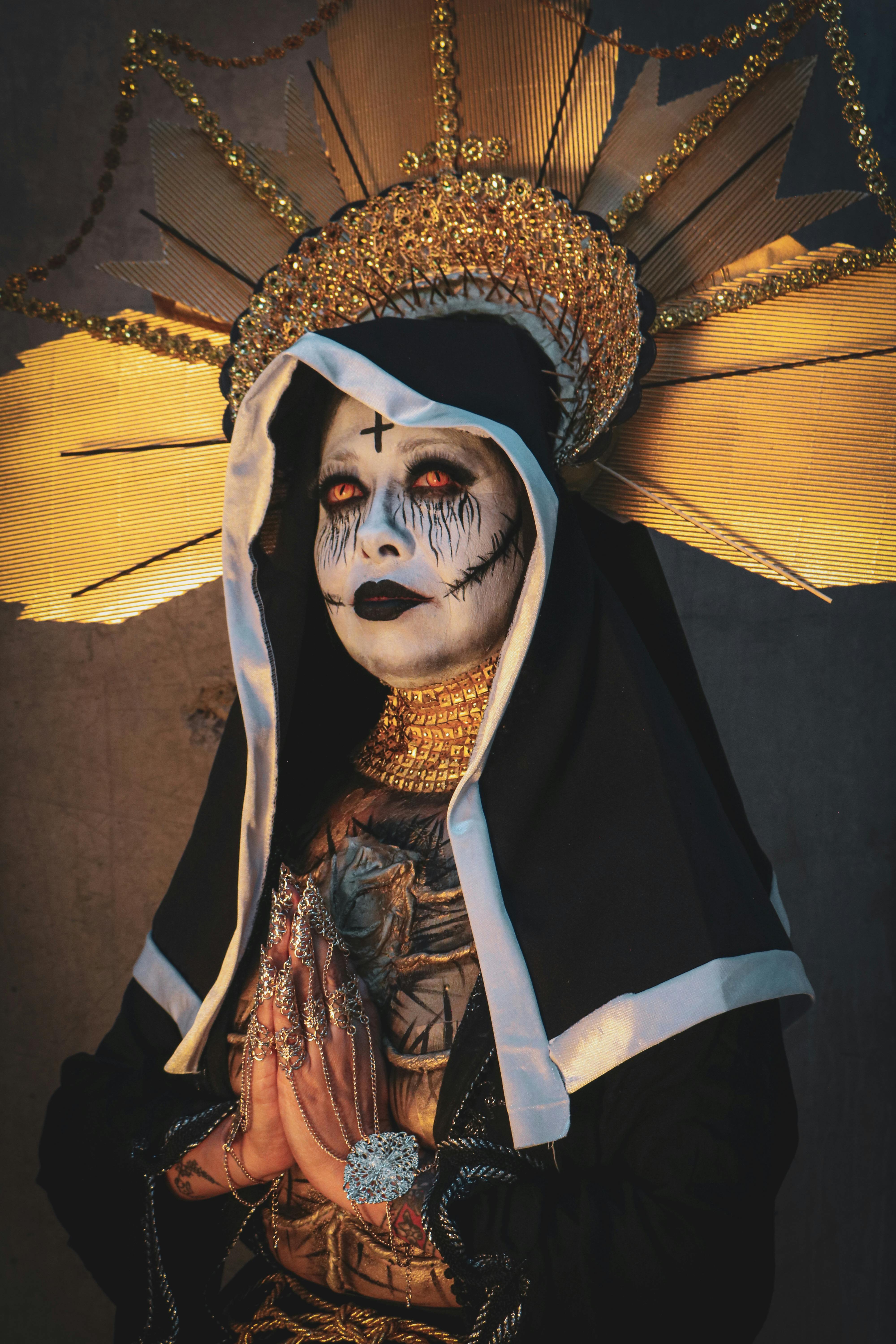 Dramatic Gothic Nun with Artistic Face Paint · Free Stock Photo