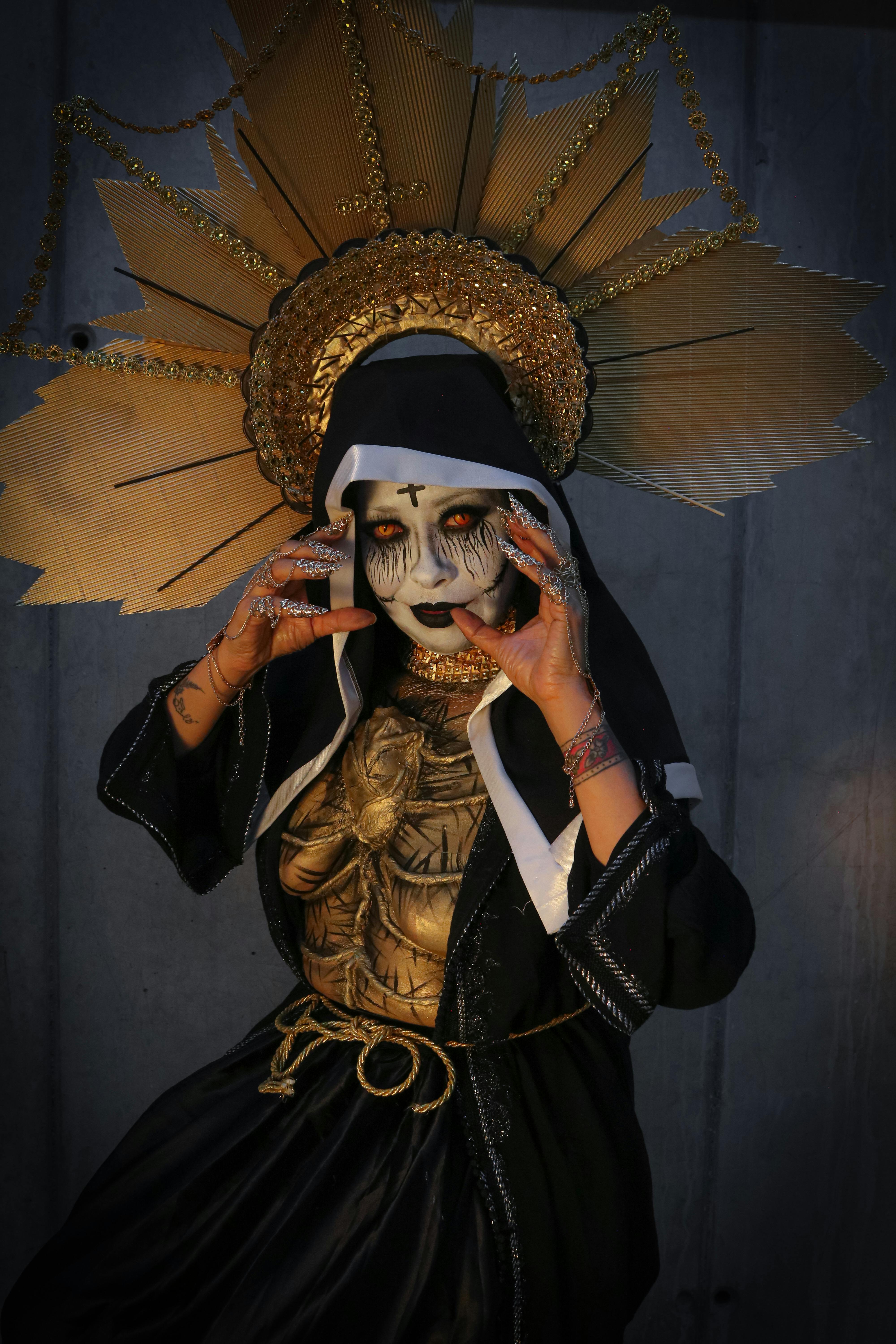 Gothic Nun with Skeleton Makeup and Halo · Free Stock Photo